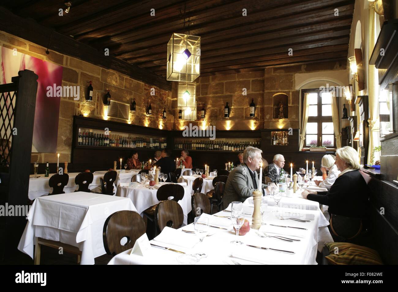 People sitting at table in restaurant, Germany Stock Photo - Alamy