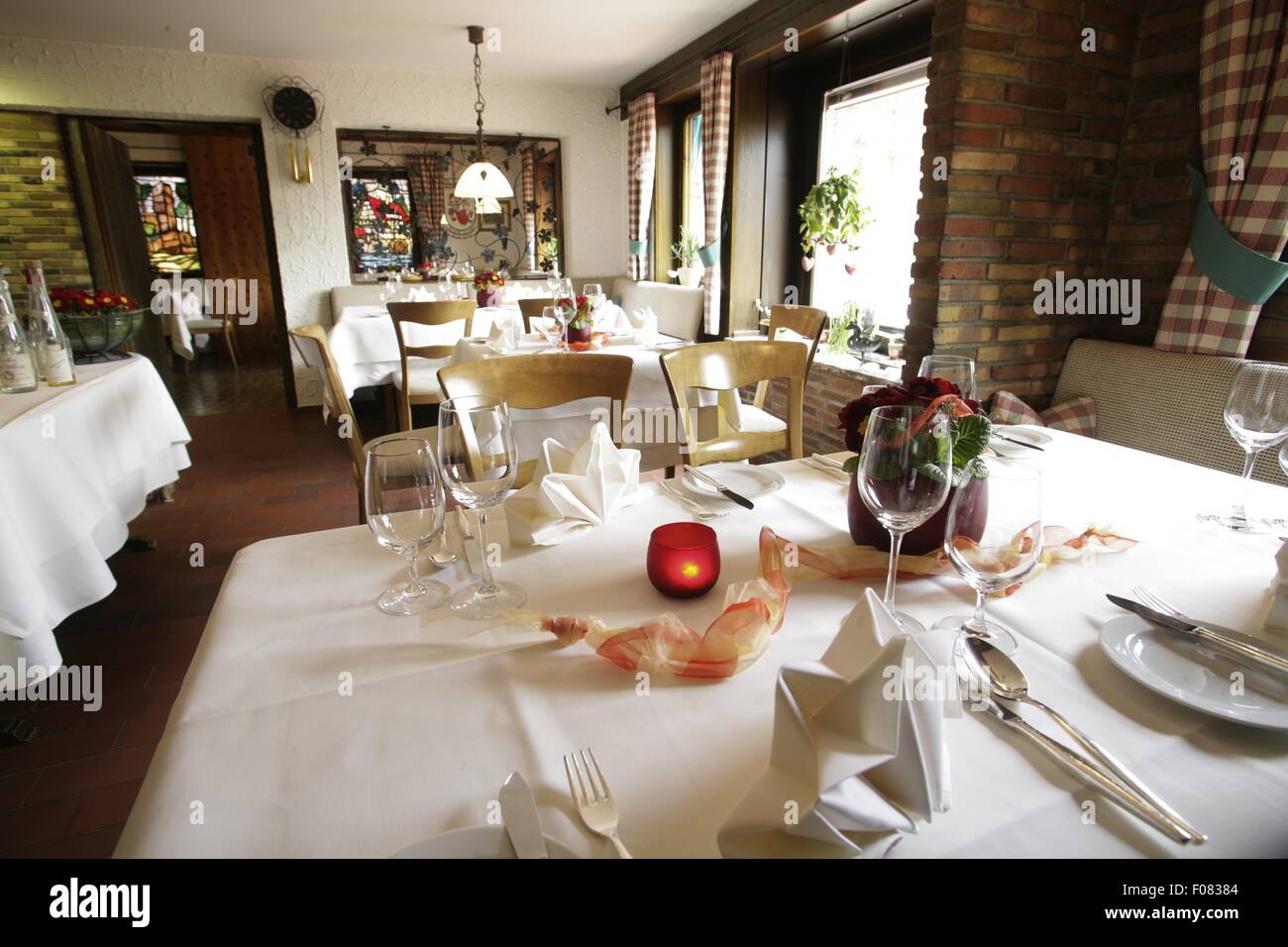 Tables laid in restaurant, Germany Stock Photo - Alamy