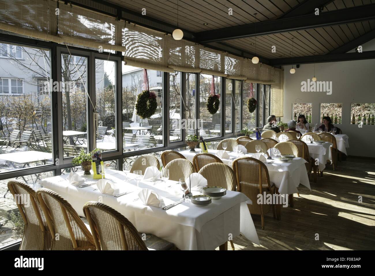 Tables laid in restaurant, Germany Stock Photo - Alamy