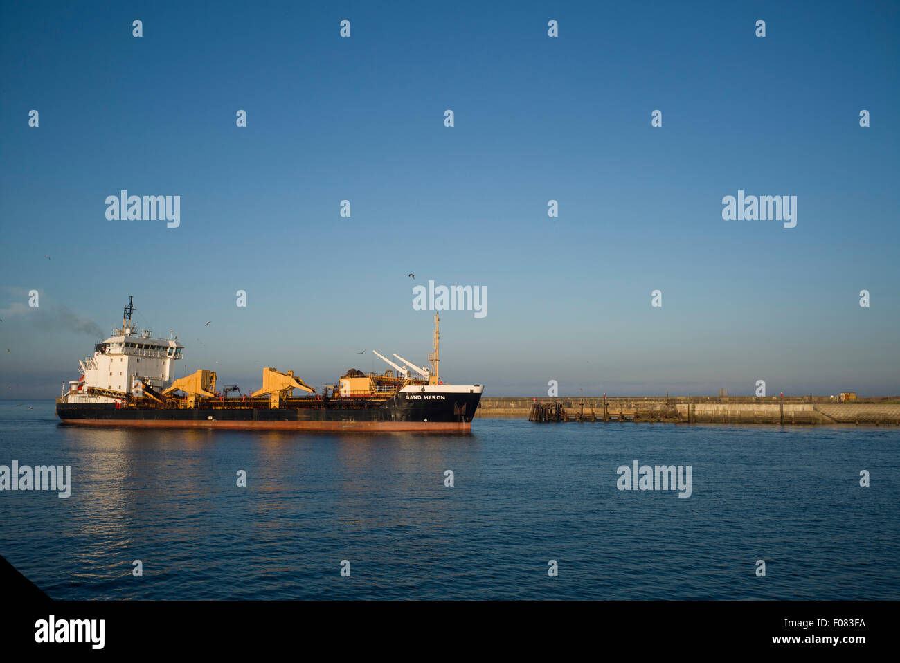 Dredger Sand Heron arriving in Shoreham Harbour, Sussex Stock Photo - Alamy