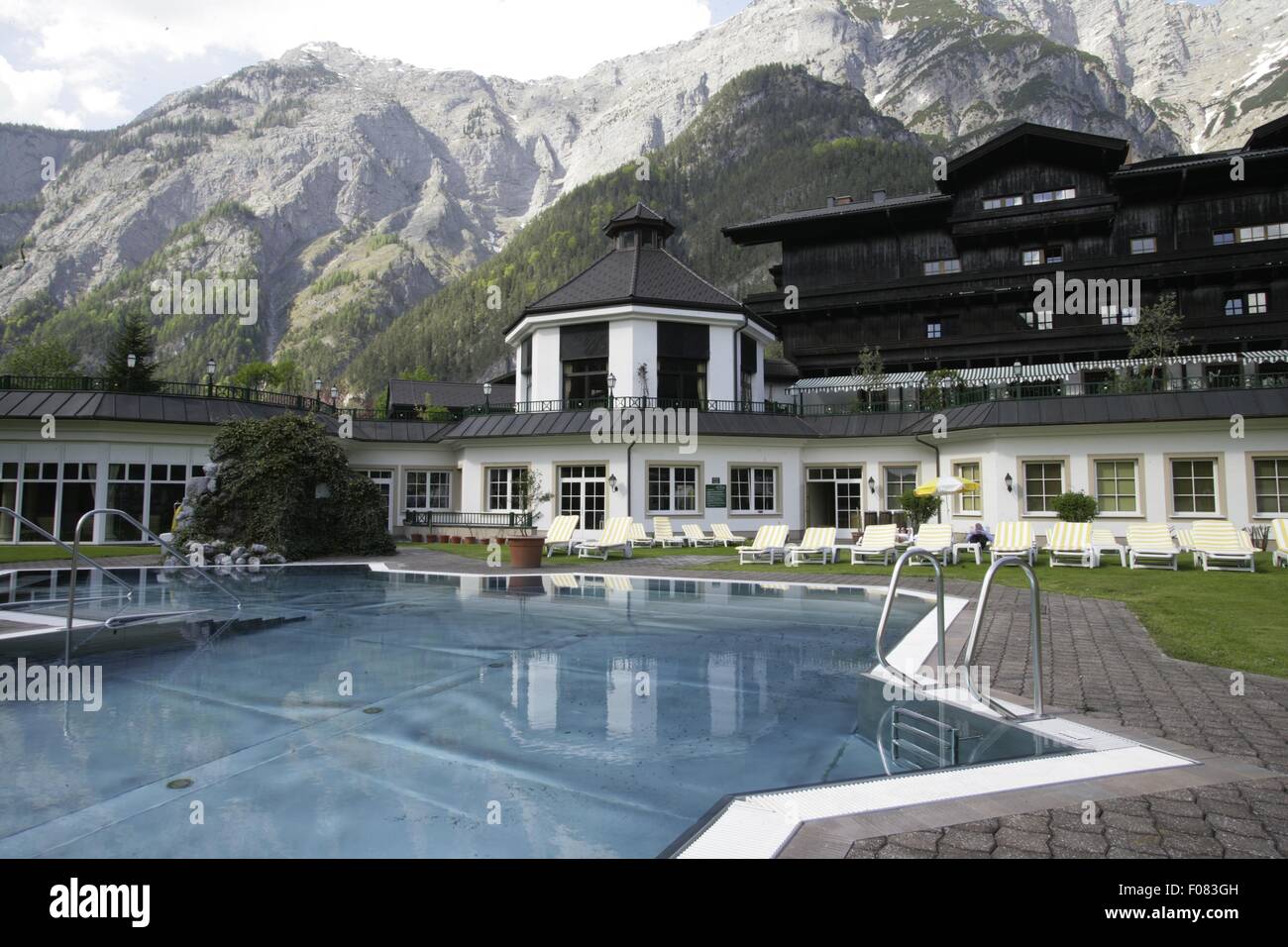 View of Hotel Gut Brandlhof with swimming pool in front, Saalfelden ...