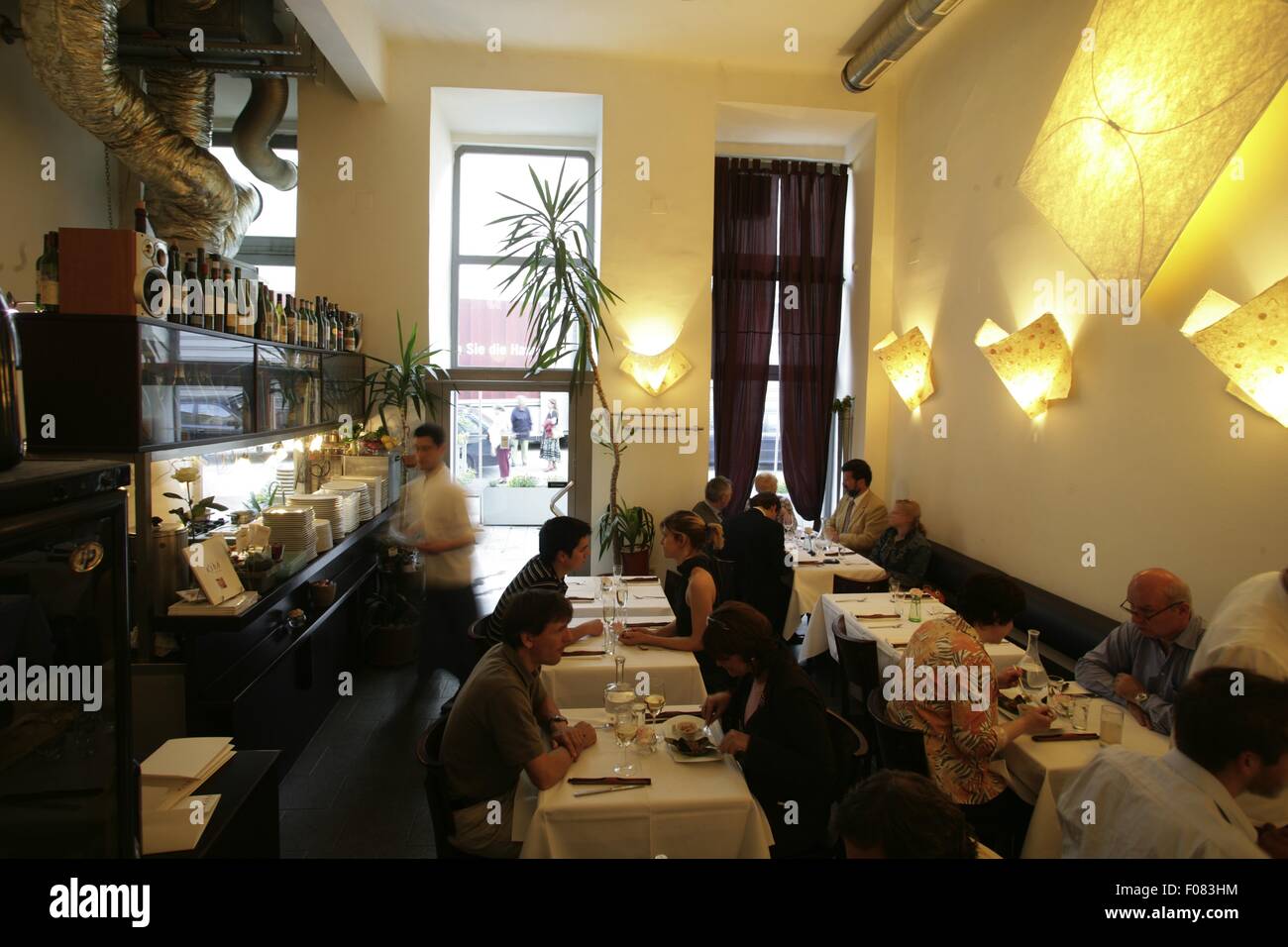 Guests dining in restaurant, Austria Stock Photo - Alamy
