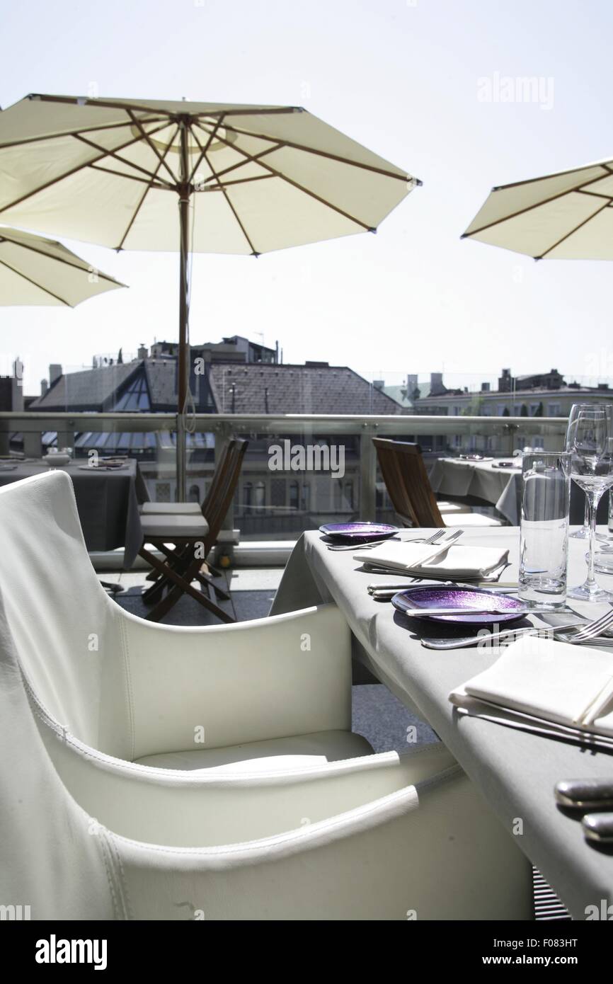 Tables laid on terrace of restaurant, Austria Stock Photo - Alamy