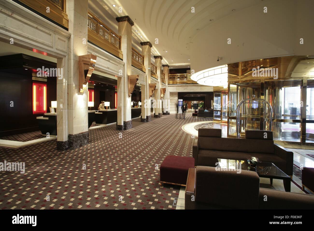 Interior of hotel with reception counter and sitting area, Germany ...