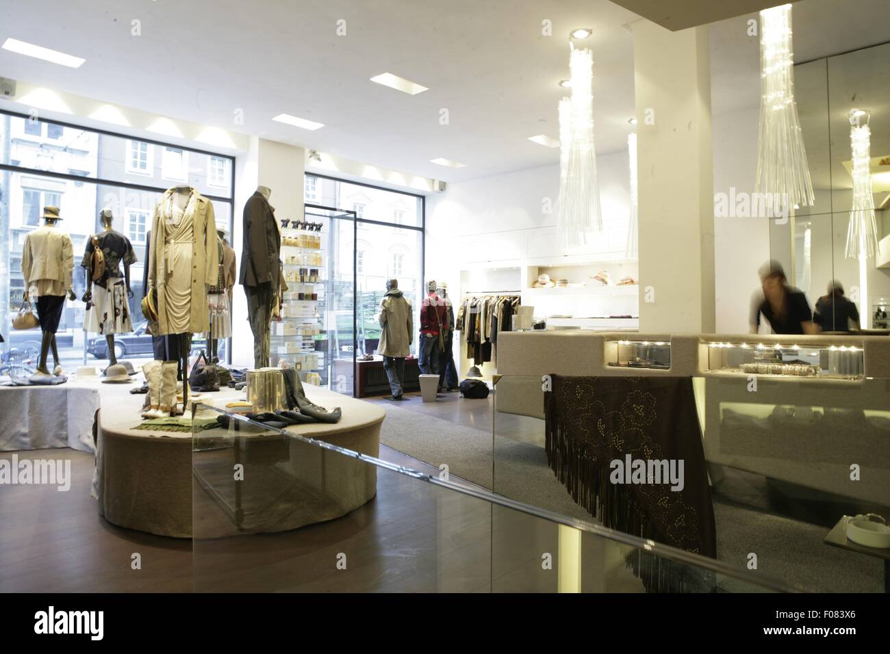 Store with mannequins and illuminated lights Stock Photo - Alamy