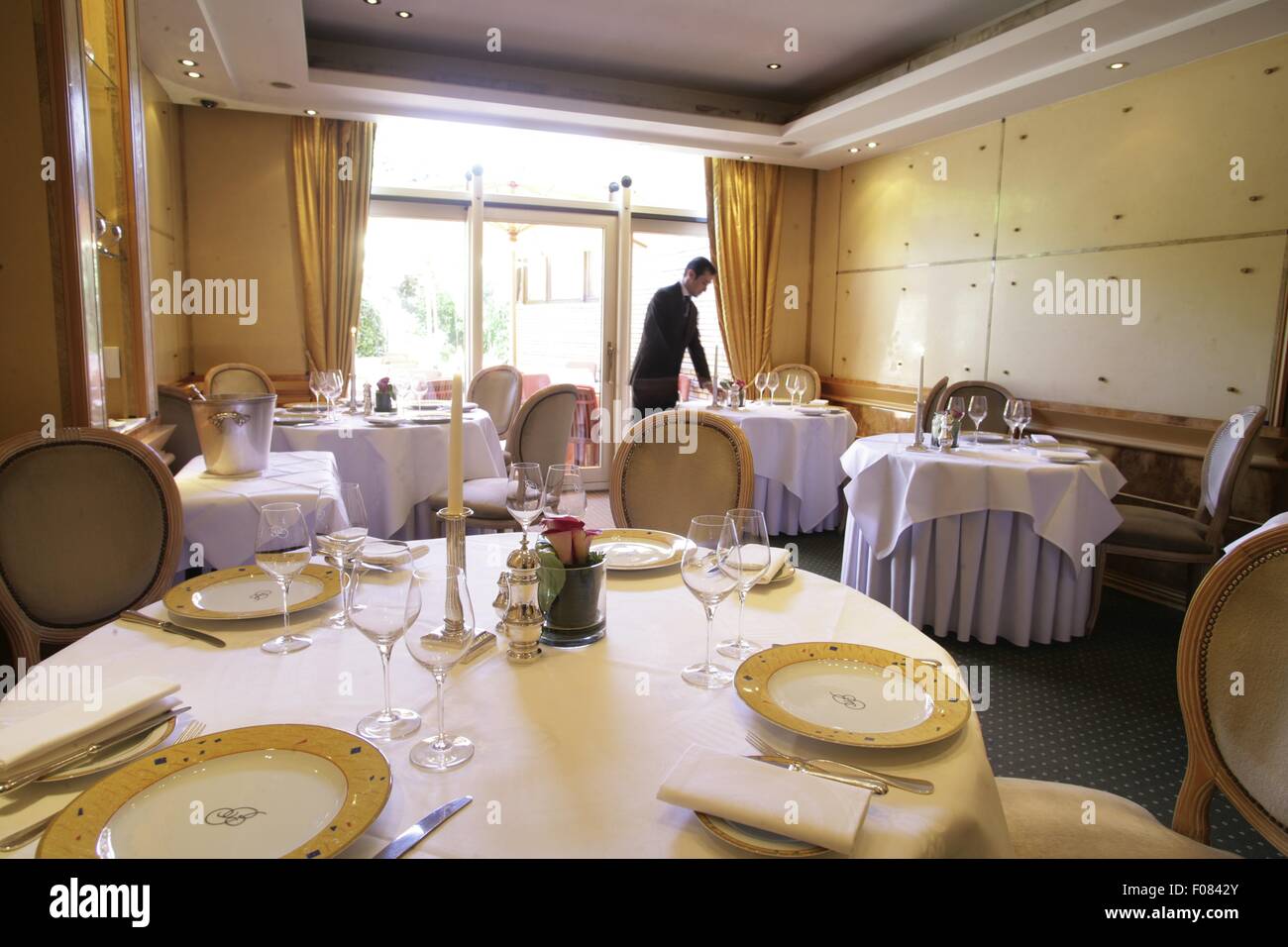 Tables laid in restaurant, Belgium Stock Photo - Alamy