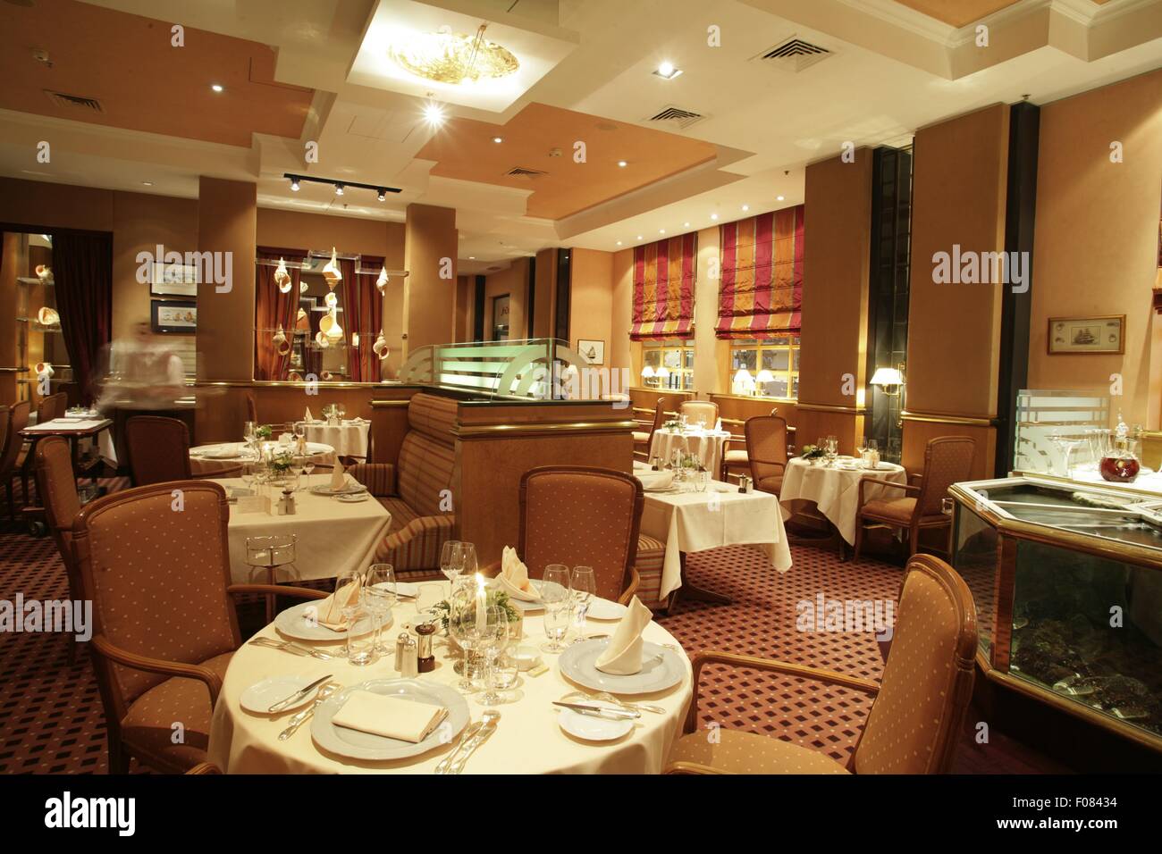 Tables laid in restaurant, Belgium Stock Photo - Alamy