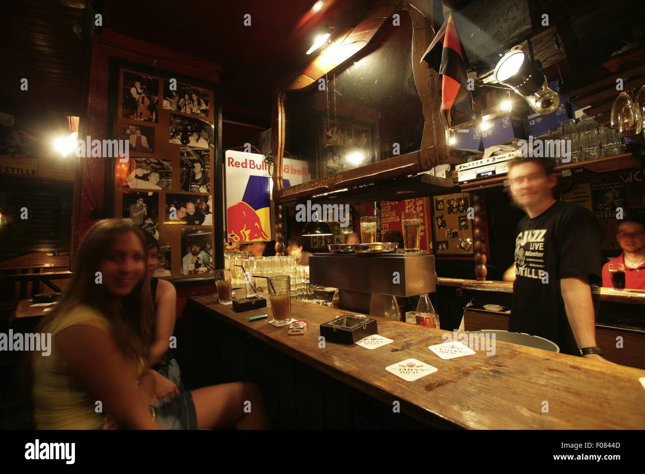 People sitting at bar counter in restaurant, Germany Stock Photo - Alamy