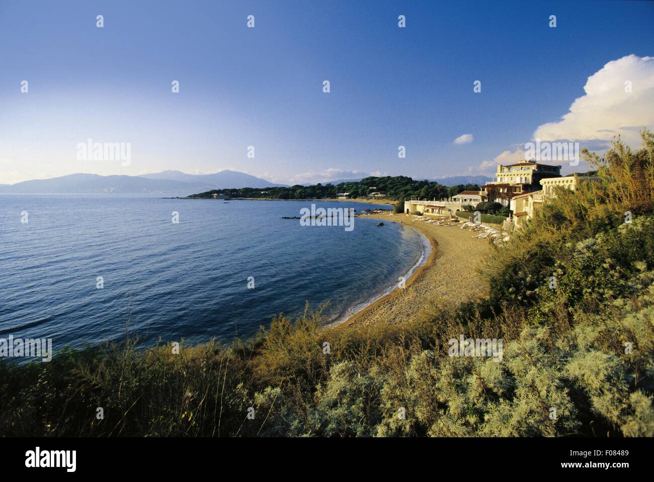 Elevated view of sea and Hotel Le Maquis Porticcio in Corsica, France ...