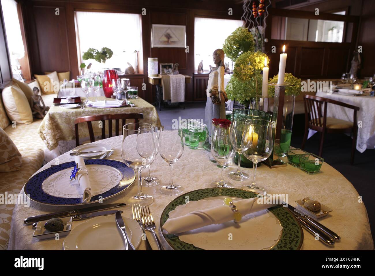 Tables laid in restaurant, Germany Stock Photo - Alamy