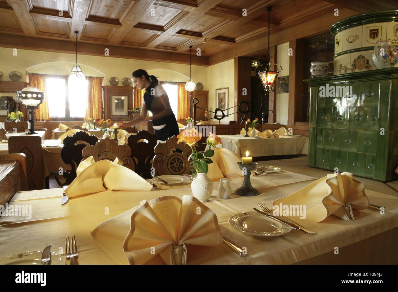 Waitress setting table in restaurant, Germany Stock Photo - Alamy