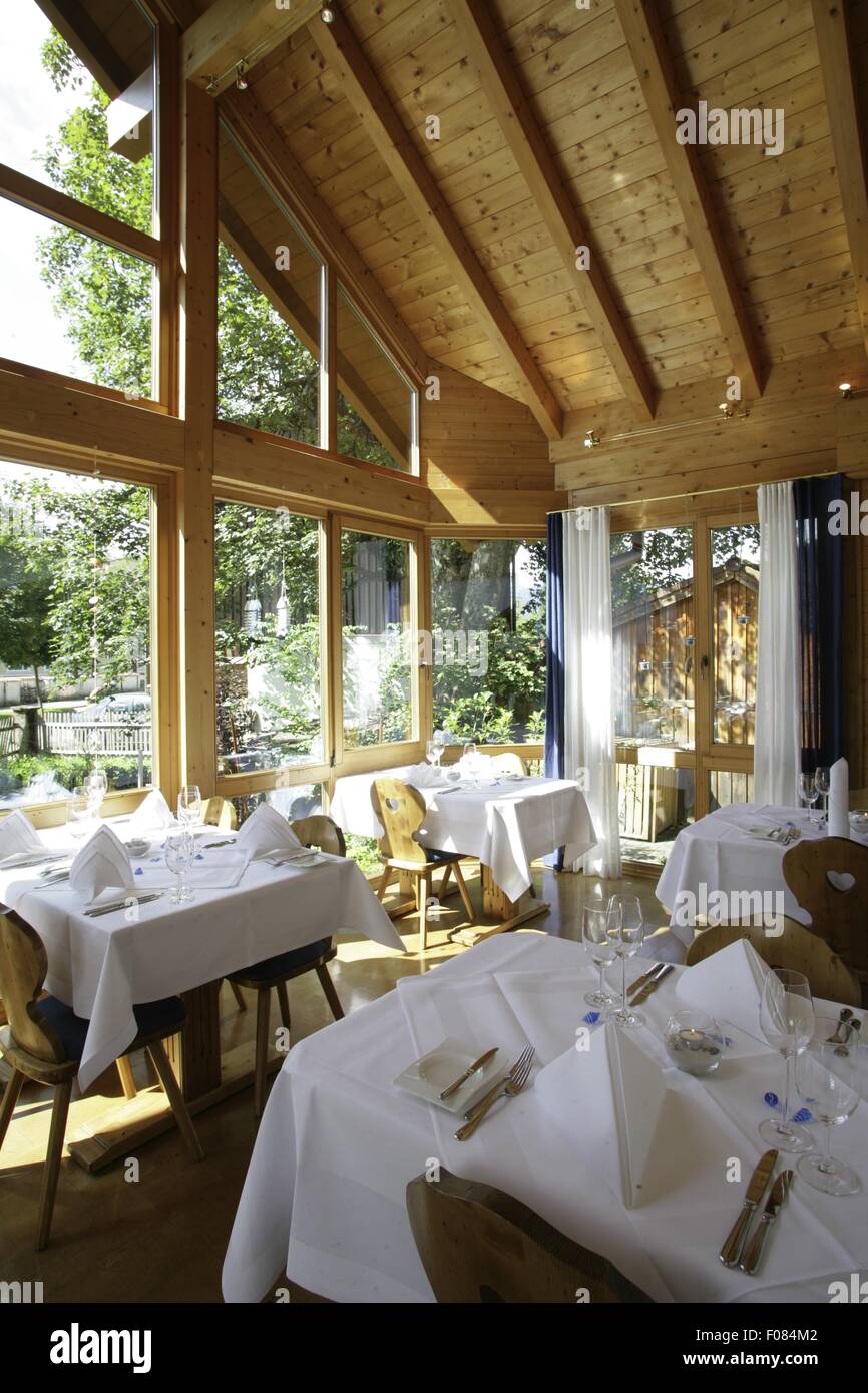 Tables laid in restaurant, Germany Stock Photo - Alamy