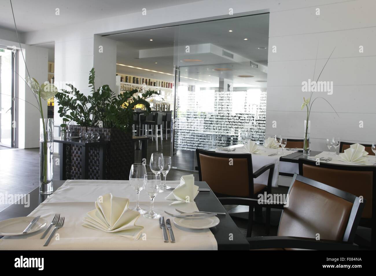 Tables laid in restaurant, Germany Stock Photo - Alamy