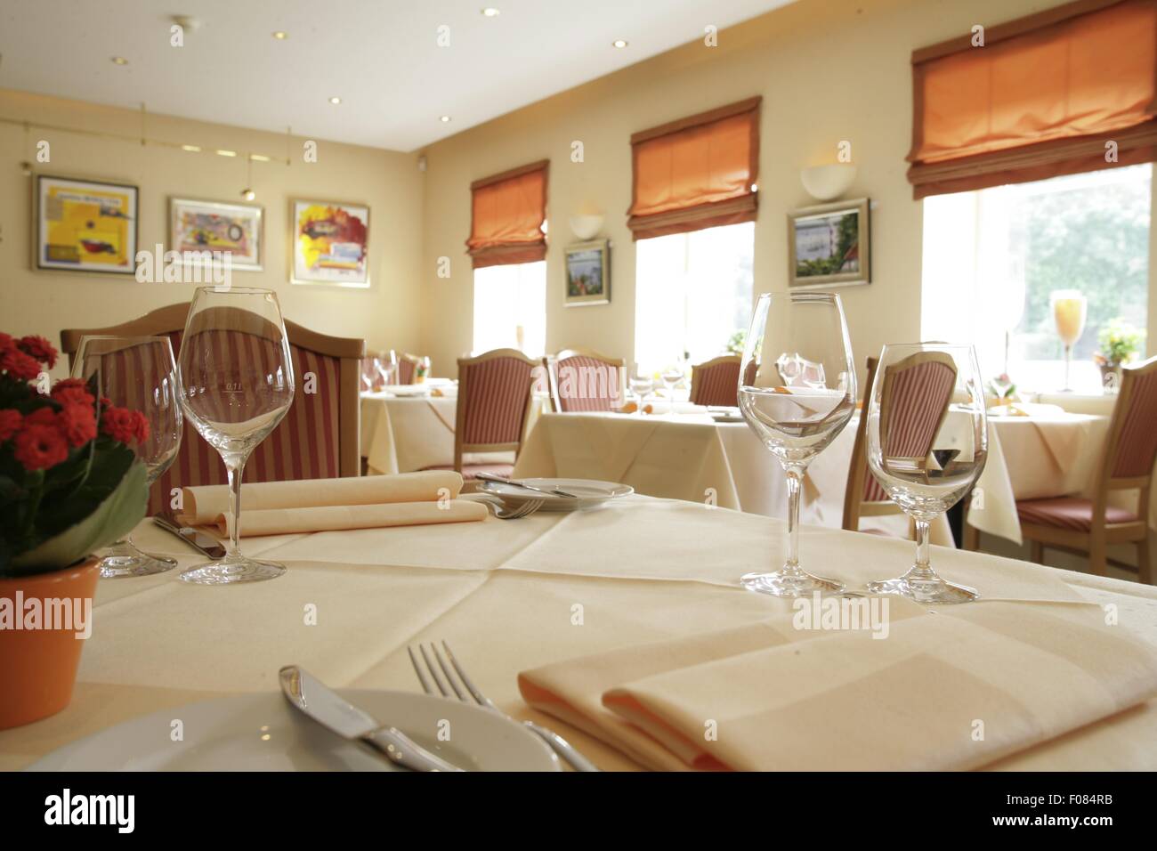Tables laid in restaurant, Germany Stock Photo - Alamy
