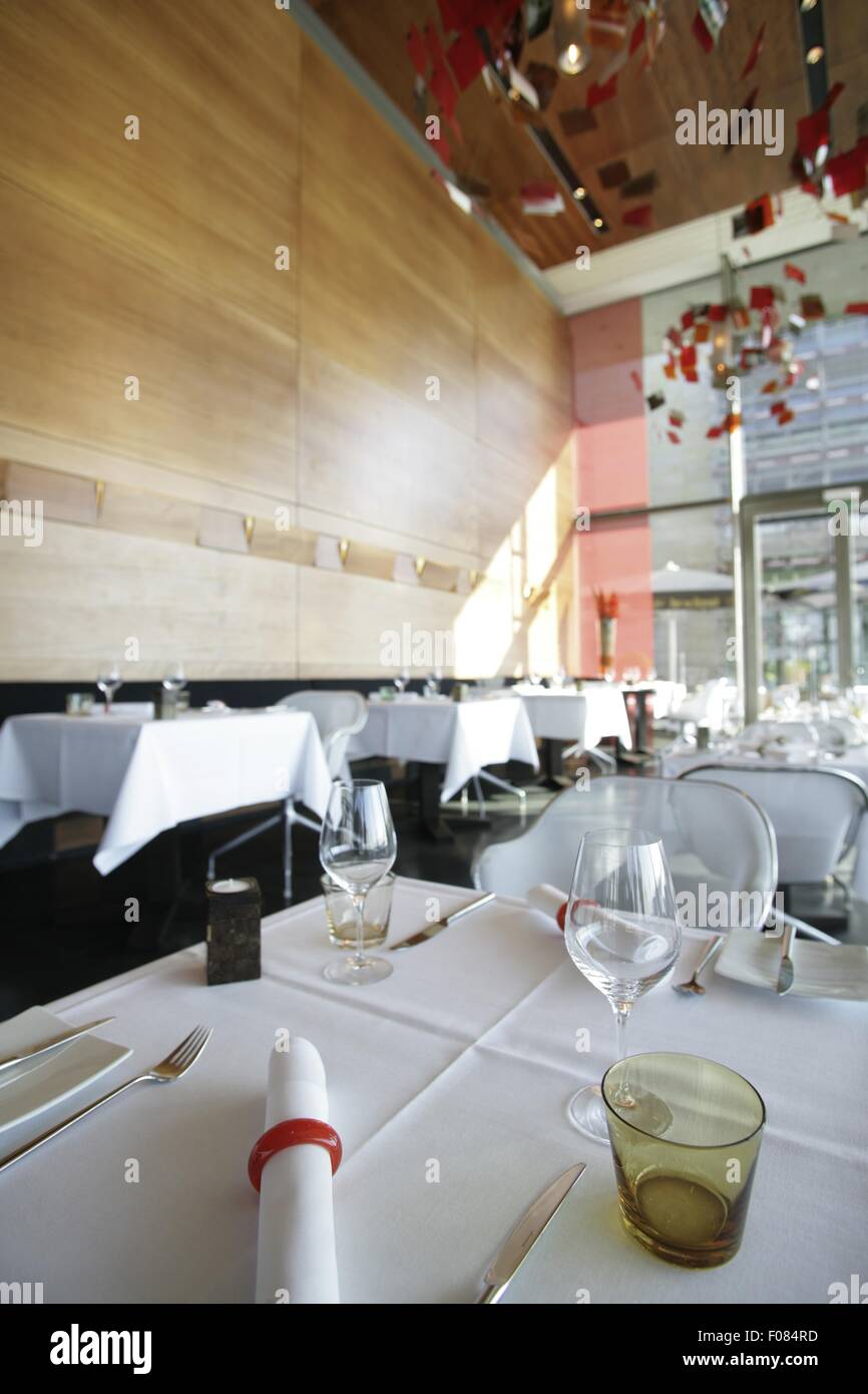 Tables laid in restaurant, Germany Stock Photo - Alamy