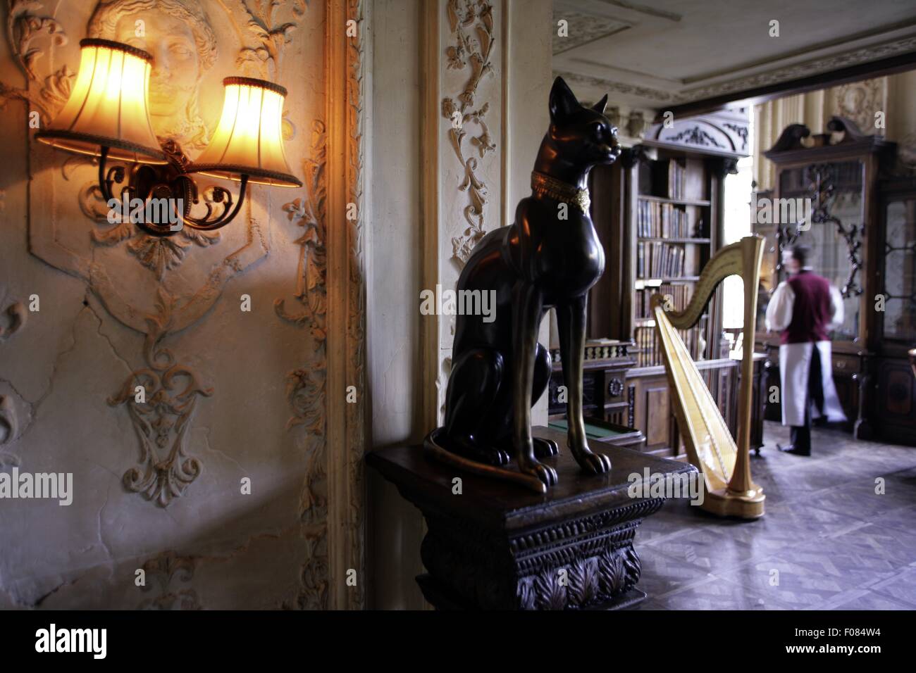 Sculpture of dog and waiter standing in Cafe Pushkin in Moscow, Russia ...