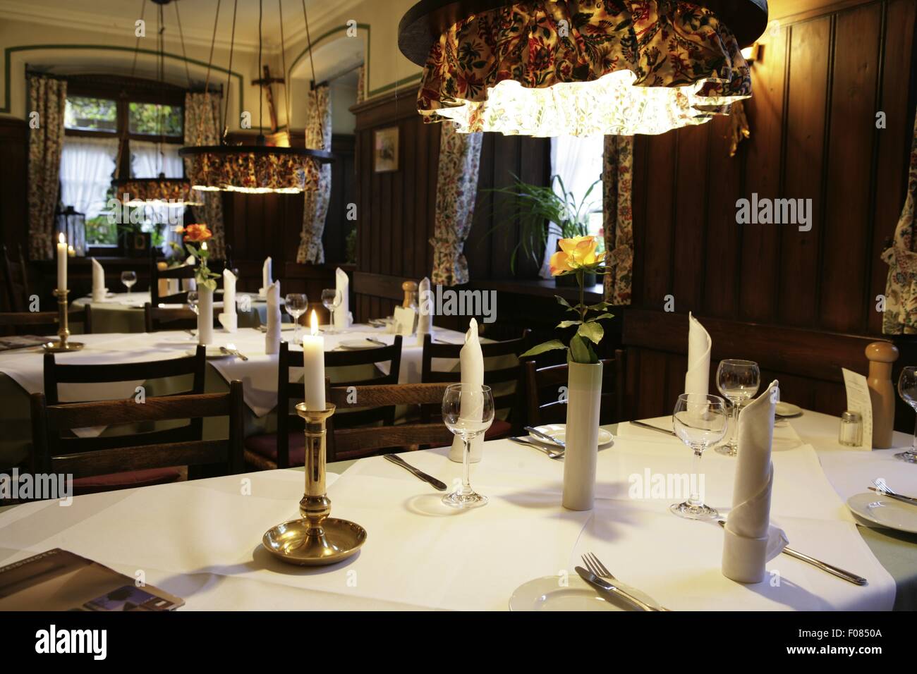 Tables laid in restaurant, Germany Stock Photo - Alamy