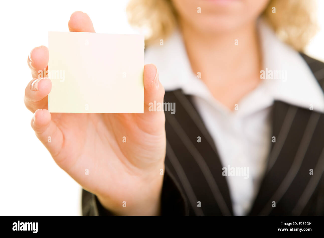 Blond business woman holding some empty post-its Stock Photo - Alamy