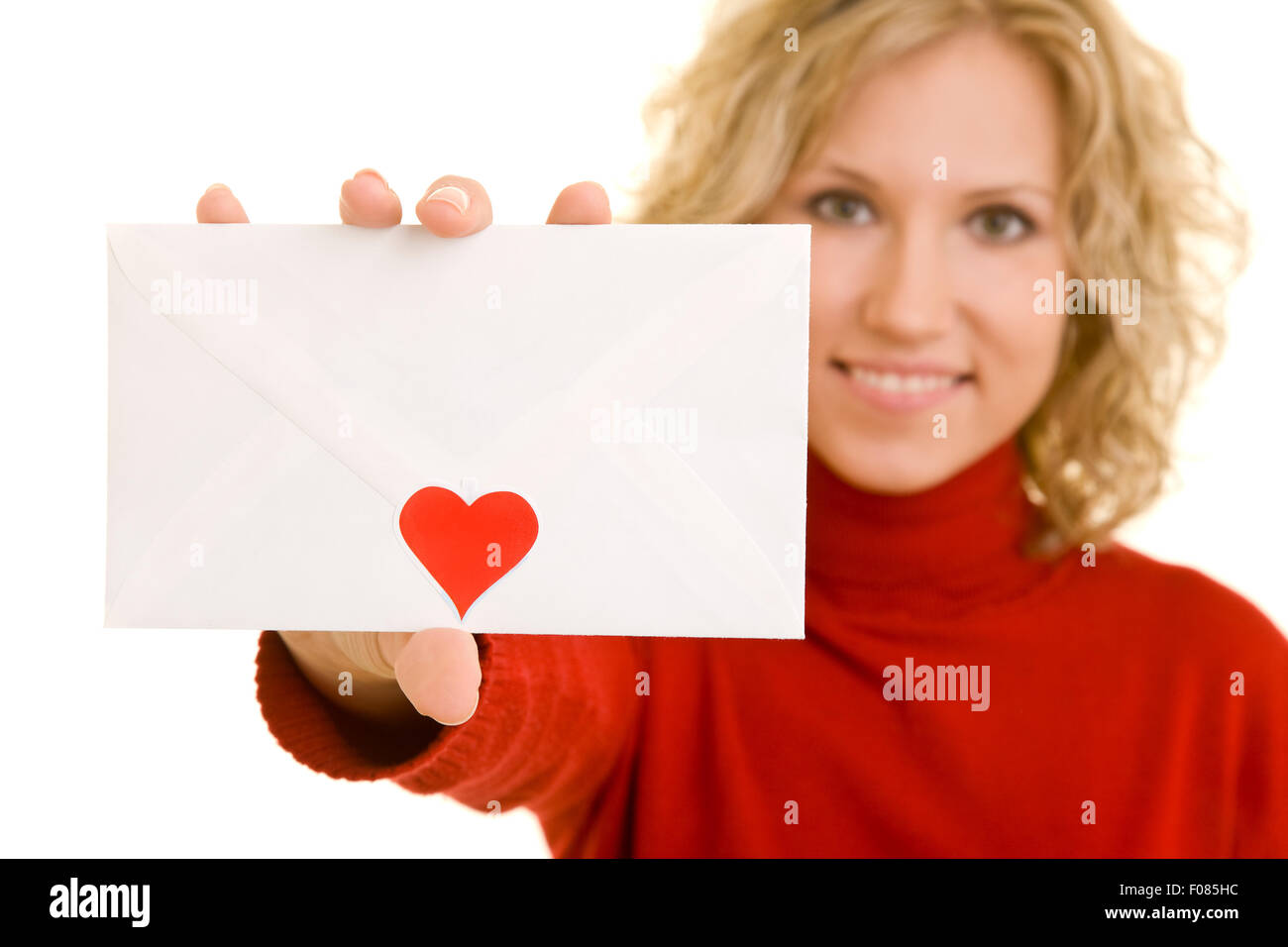 Happy young woman showing a love letter Stock Photo - Alamy