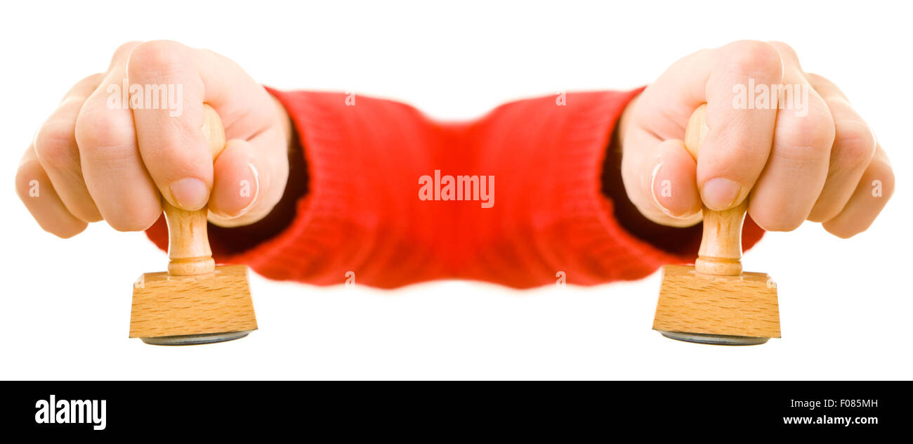 Two arms with stamps in their hands Stock Photo - Alamy