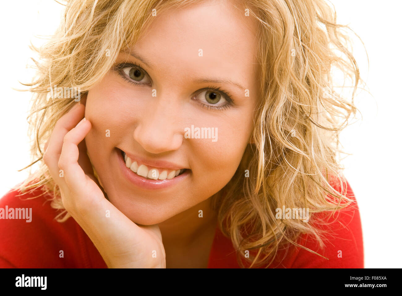 Attractive smiling woman laughing into the camera Stock Photo - Alamy