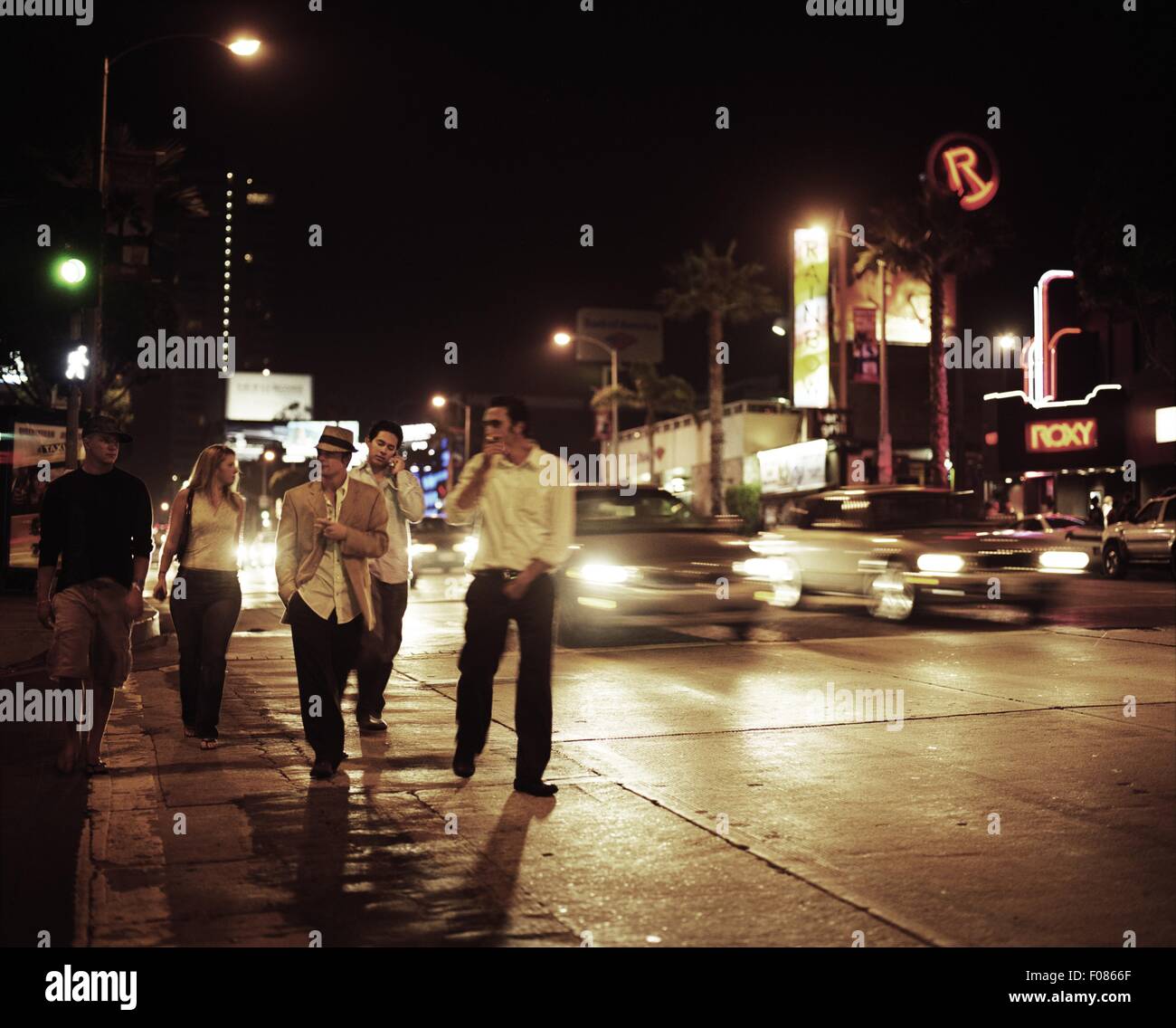 People walking on road at night in Los Angeles, California, USA Stock ...