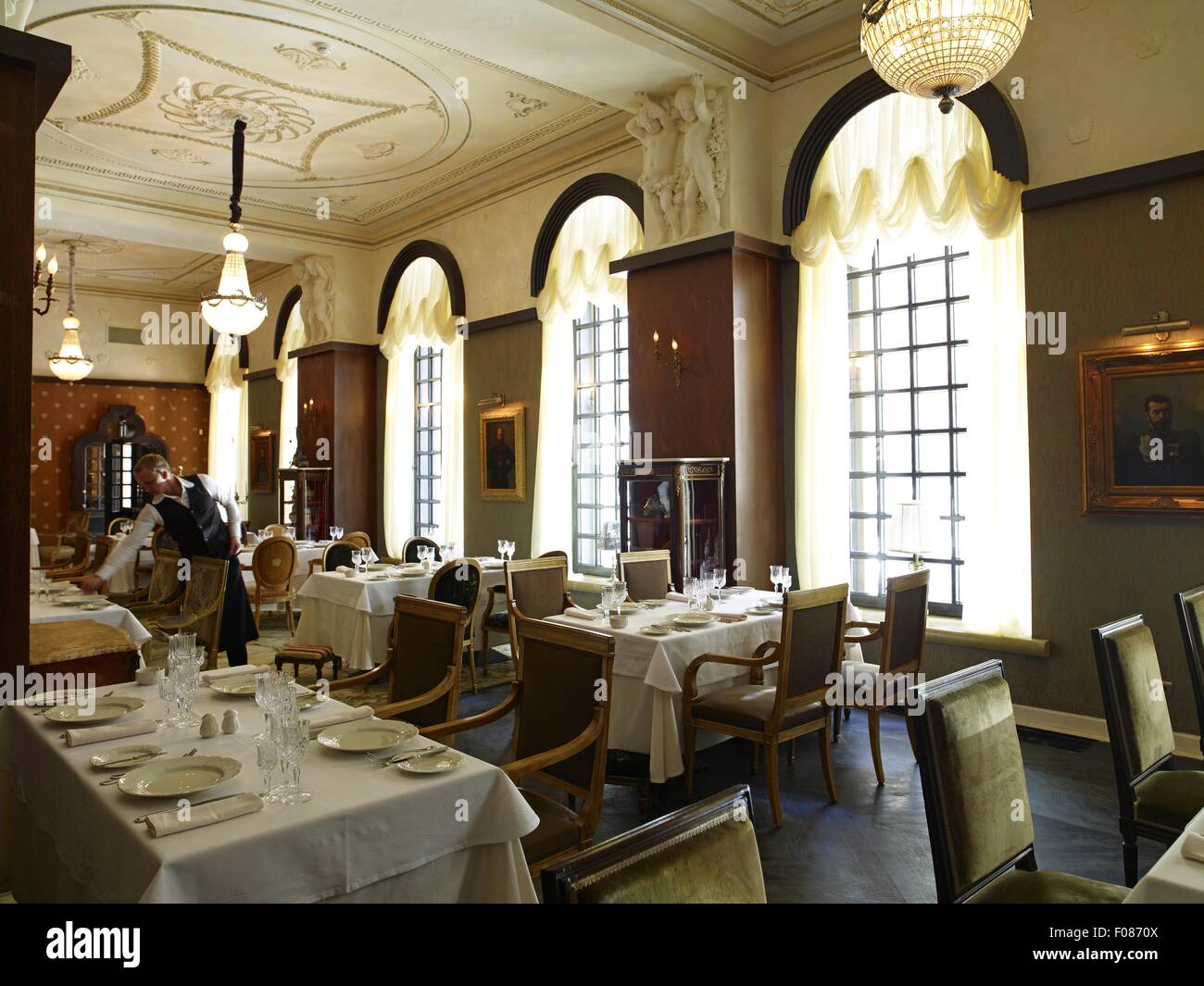 Waiter decorating table in Tsar Restaurant, St Petersburg, Russia Stock ...