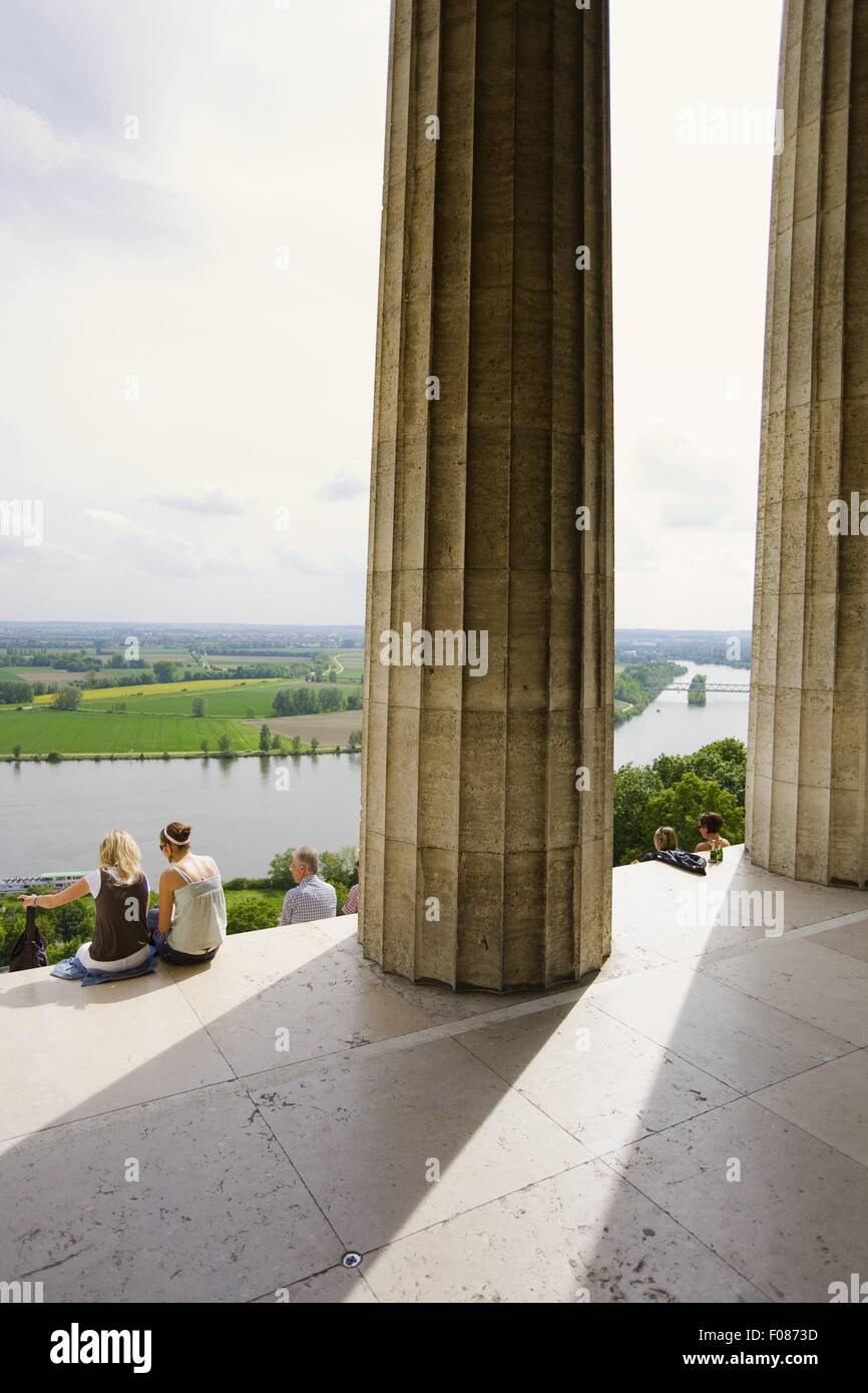 People sitting at Plateau Doric columns in The Walhalla against Danube ...