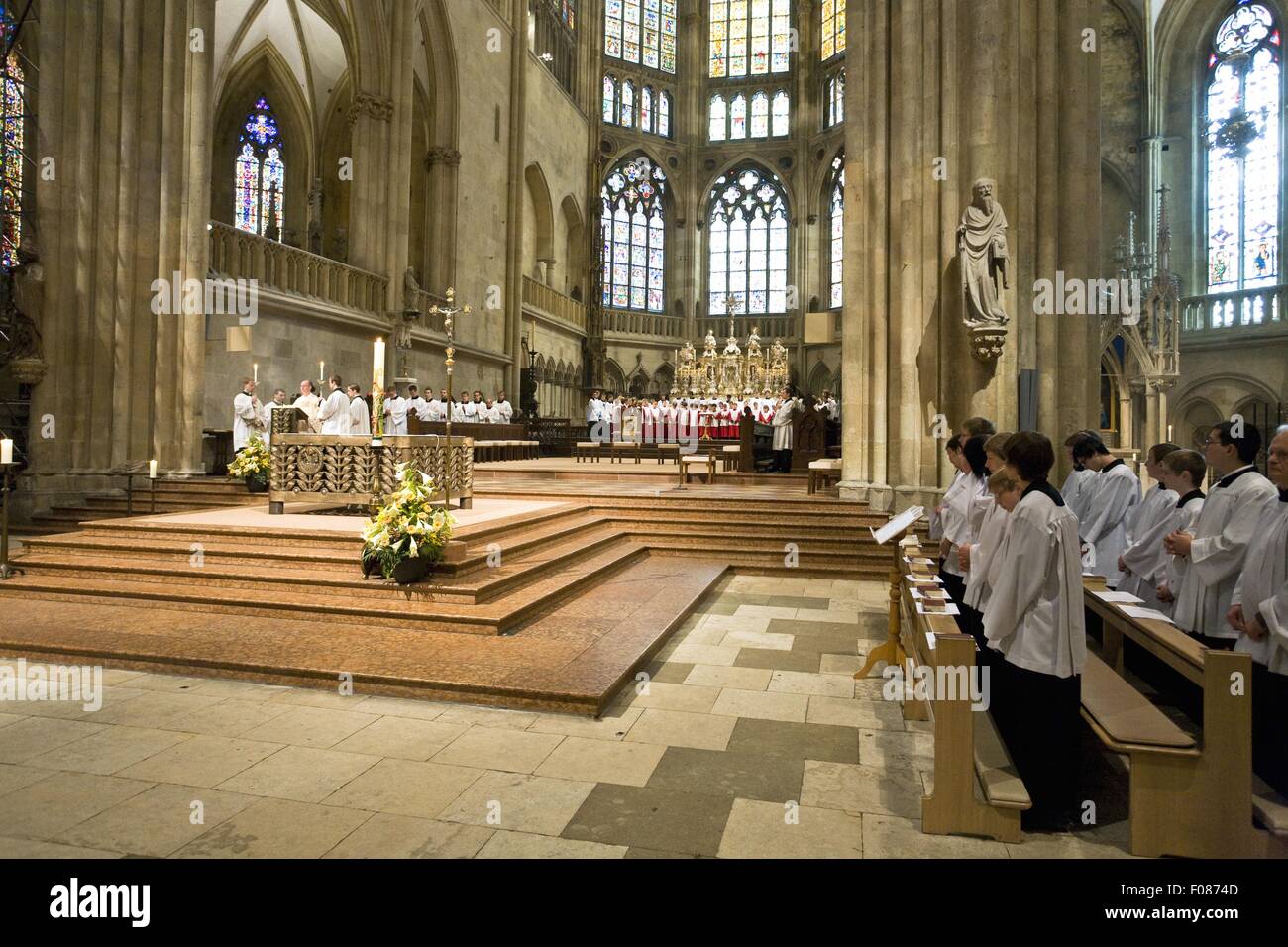 Choir singing for Sunday mass in Regensburg Cathedral, Germany Stock ...