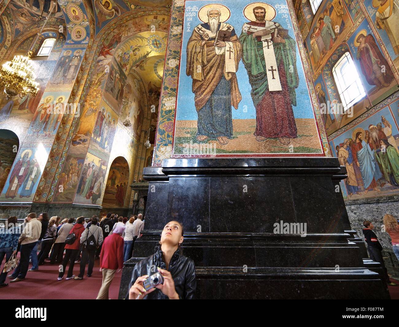 People inside Christ Resurrection Cathedral in St. Petersburg, Russia ...