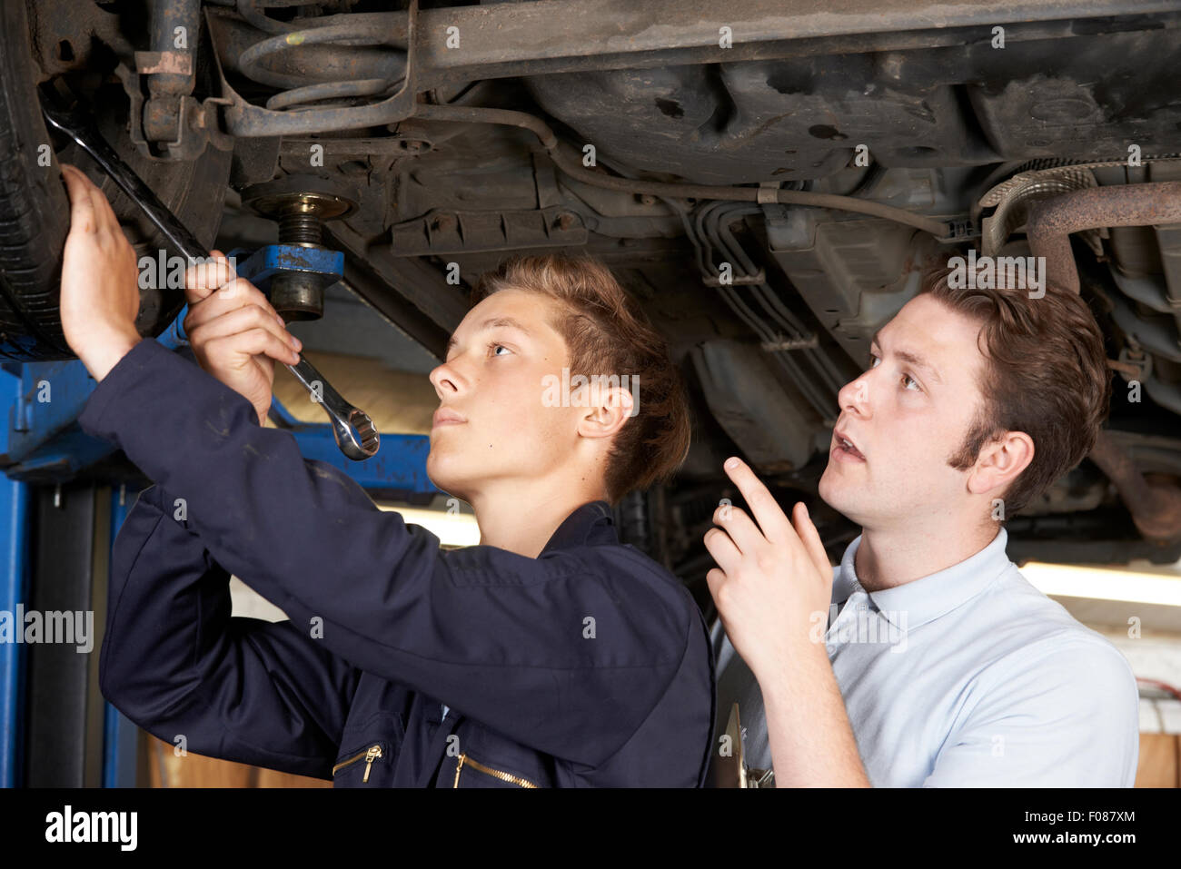 Teen working on car hi-res stock photography and images - Alamy