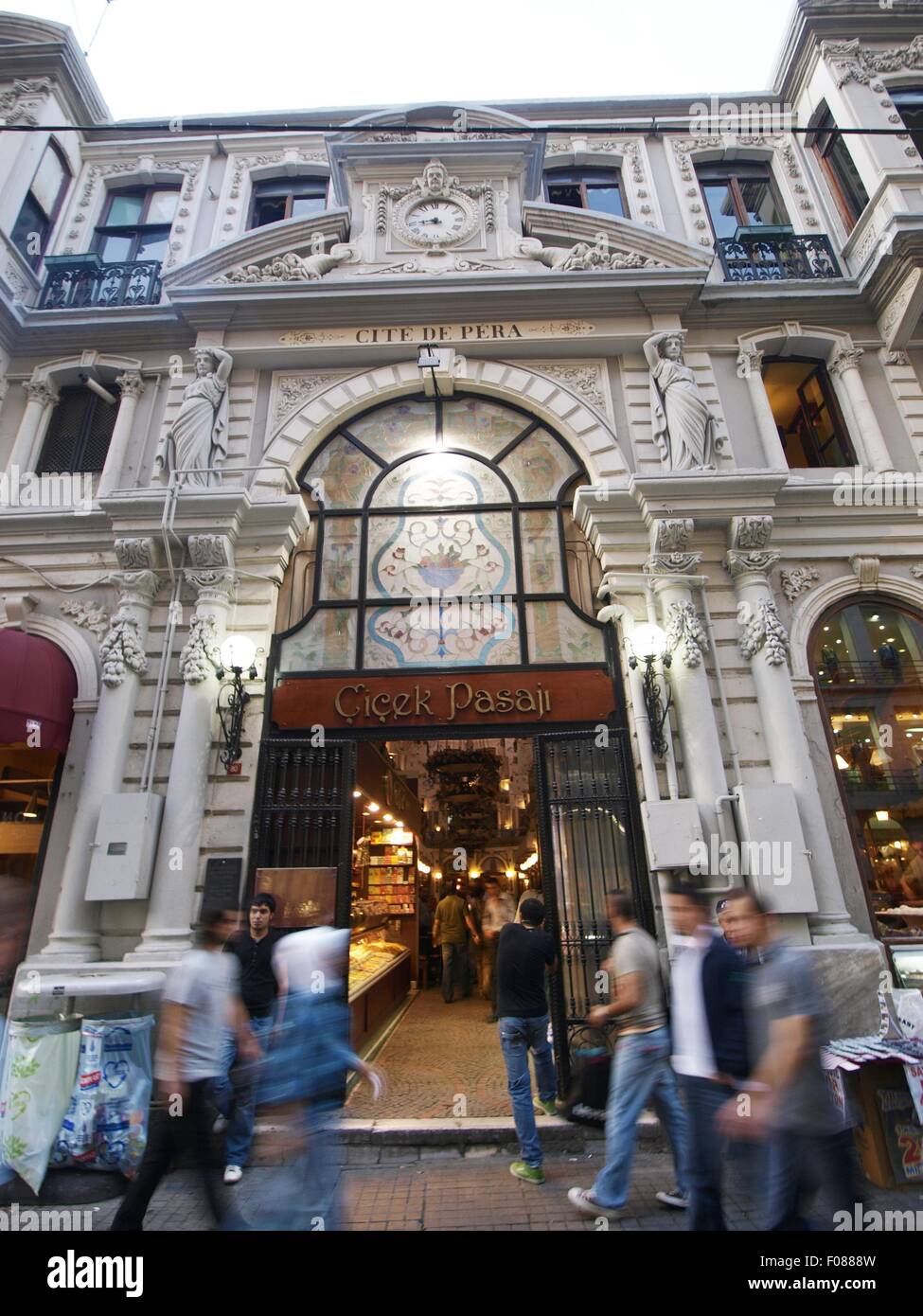 People walking into Cicek Pasaji restaurant, Istanbul, Turkey, blurred ...