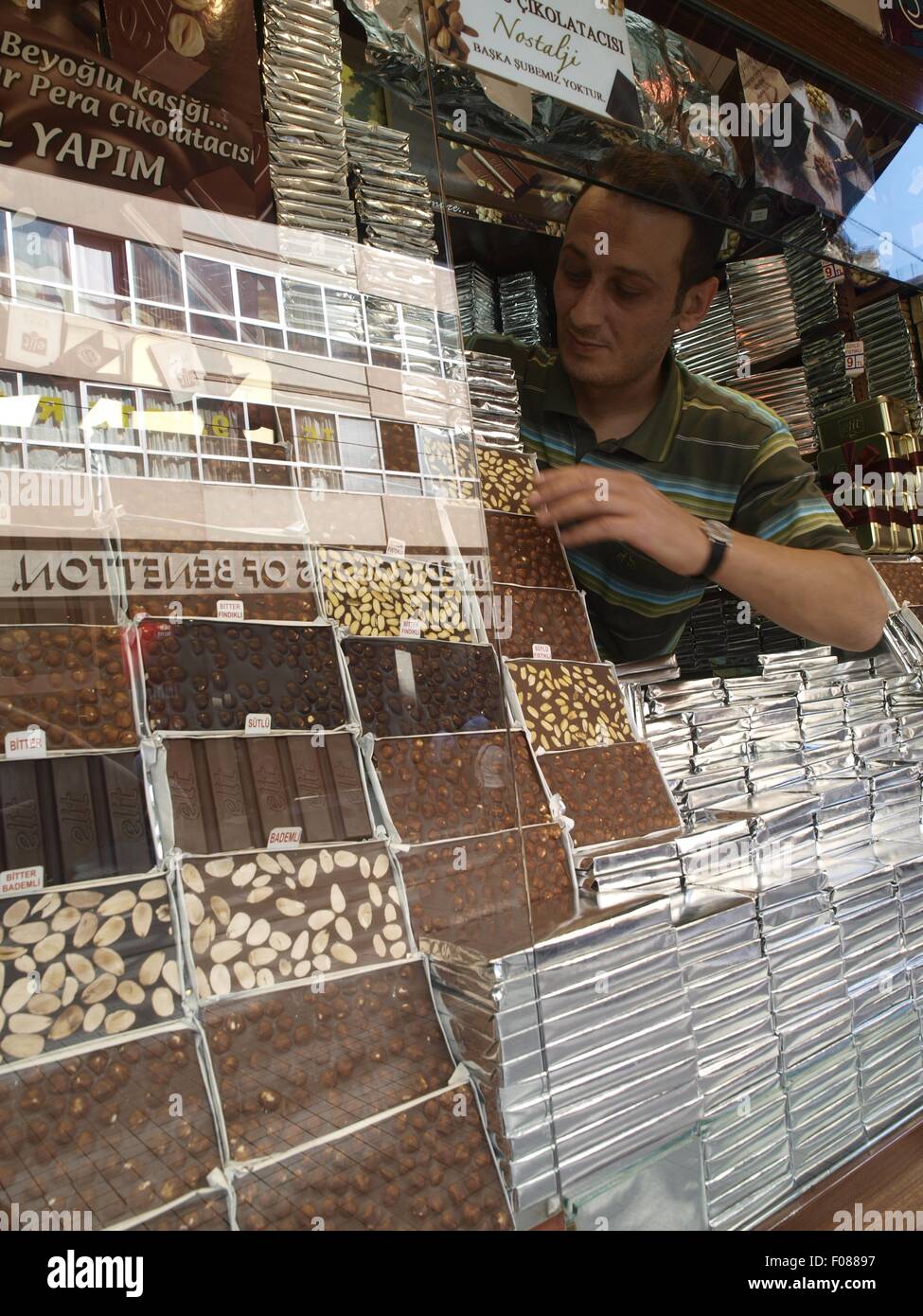 Man selling different Kiosk candies in shop at Istanbul, Turkey Stock ...