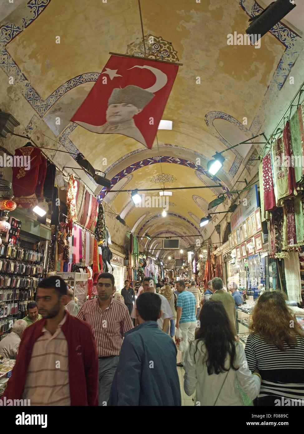 People shopping at different shops in roofed Great Market, Istanbul ...