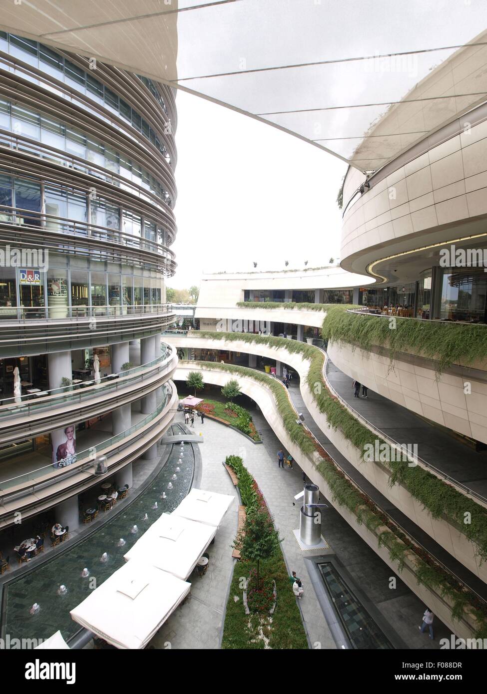 People at futuristic architectured Kanyon shopping mall in Istanbul ...