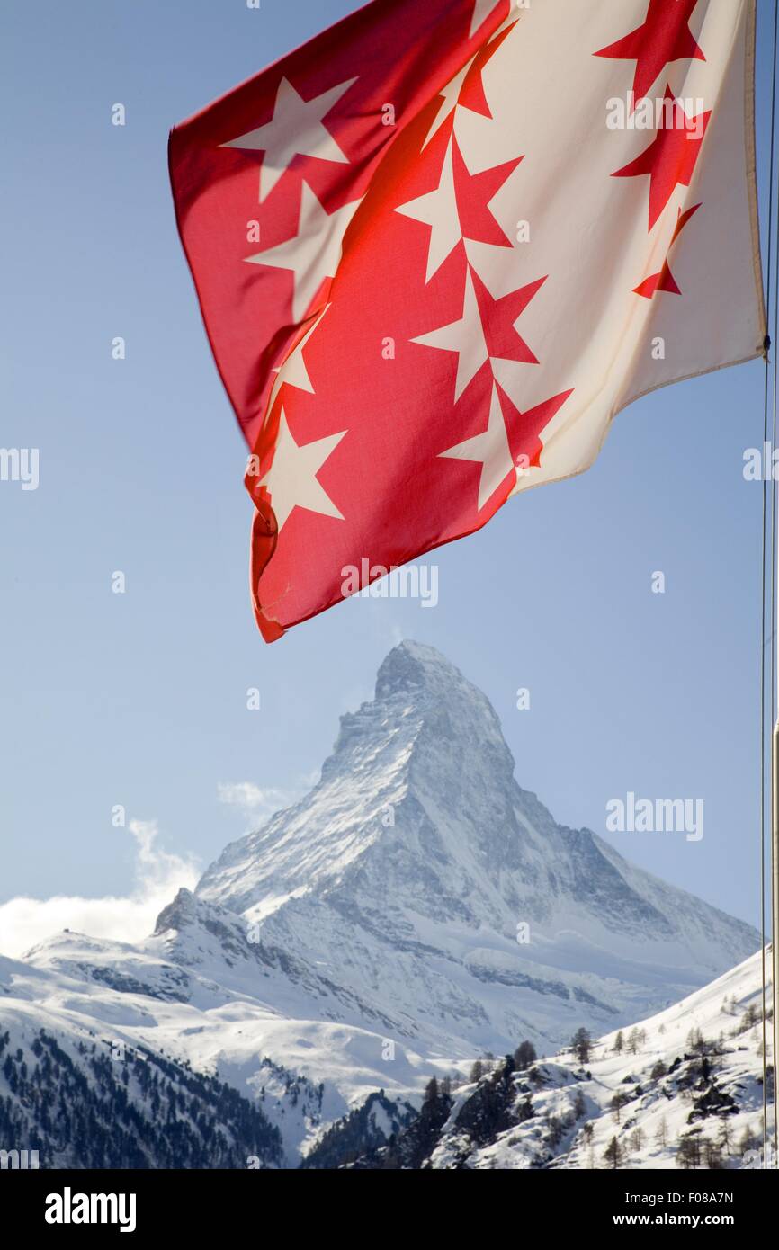 View of Matterhorn mountain and Valais flag in Switzerland Stock Photo ...