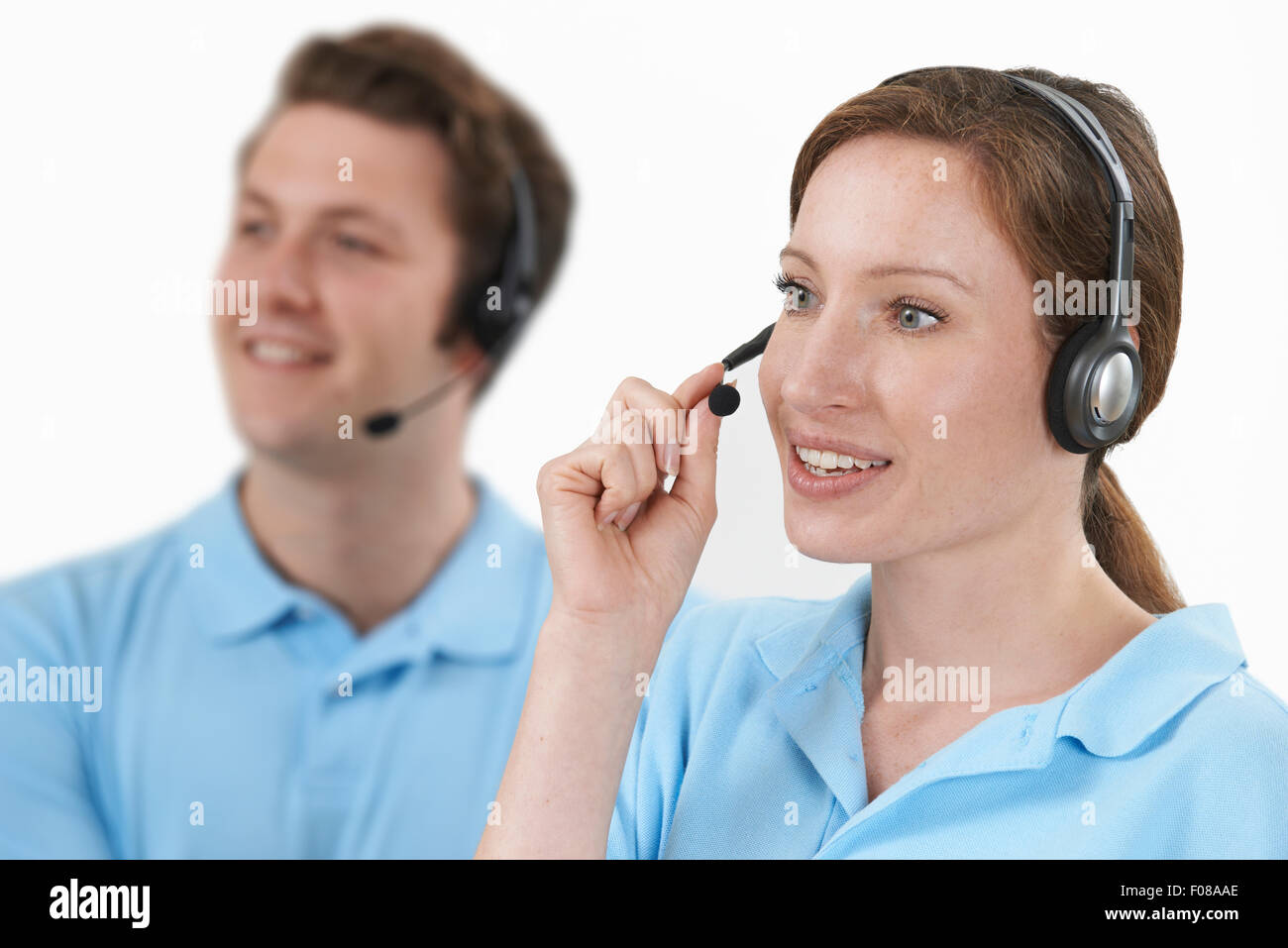 Staff Answering Calls In Customer Service Department Stock Photo - Alamy