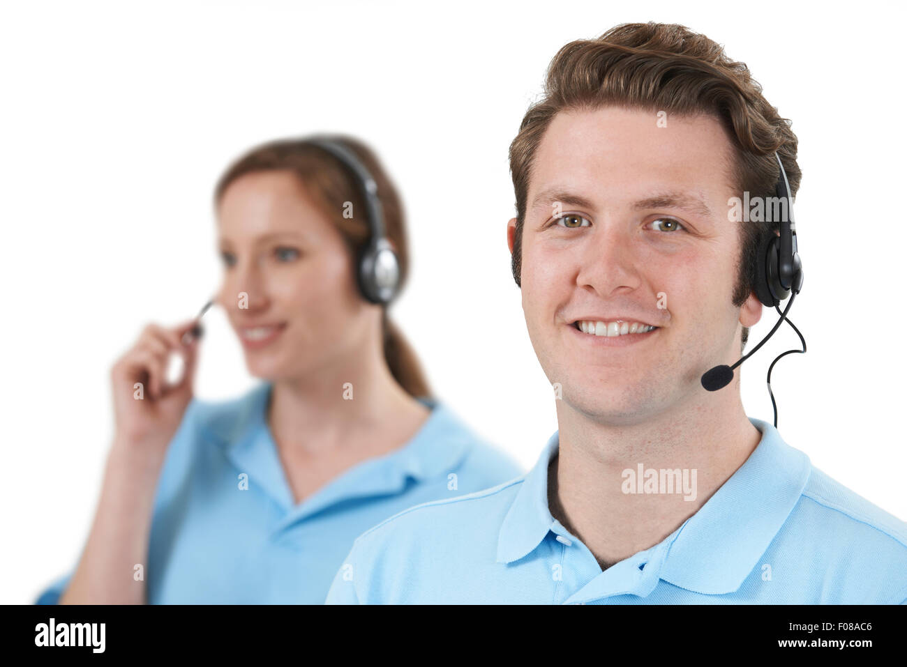 Staff Answering Calls In Customer Service Department Stock Photo - Alamy