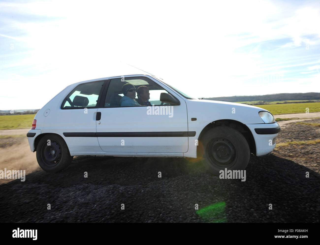 Car doing a hand brake turn, Peugeot 106 Stock Photo - Alamy