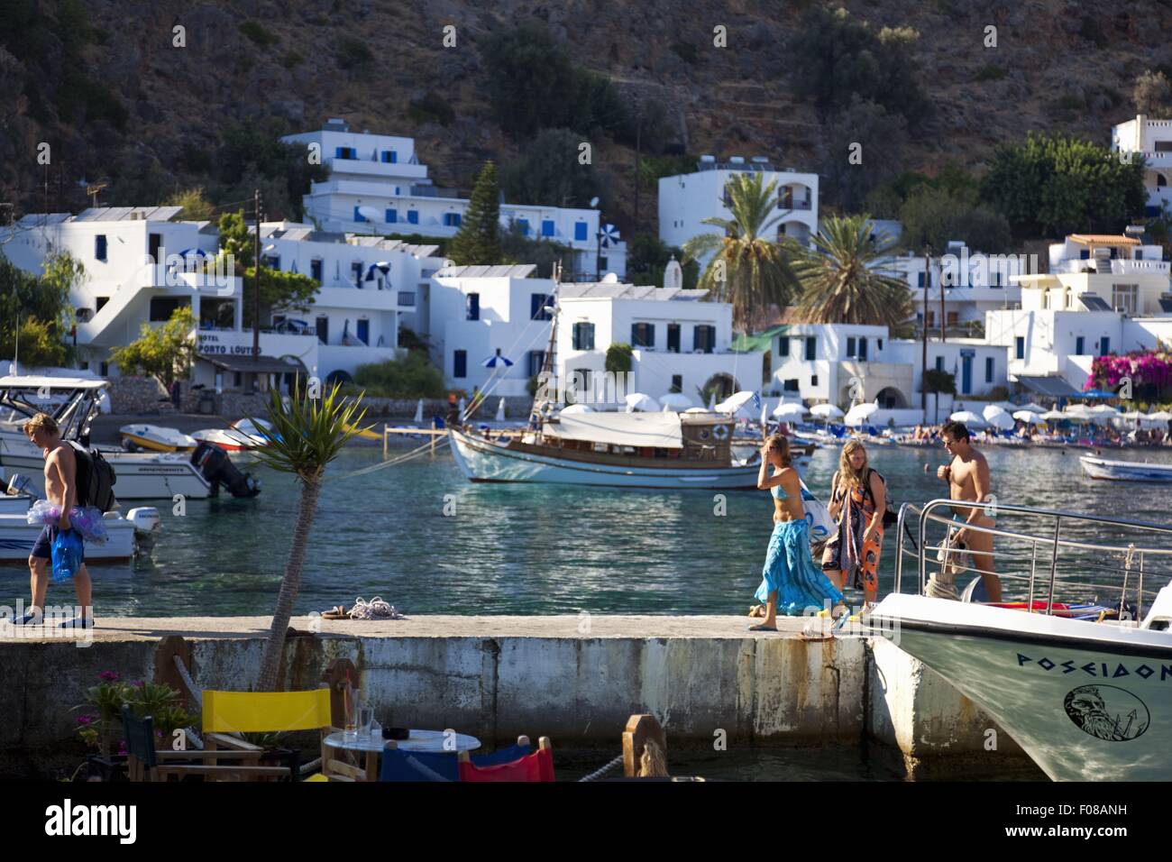 Tourists in Loutro bay in Crete, Greek Stock Photo - Alamy