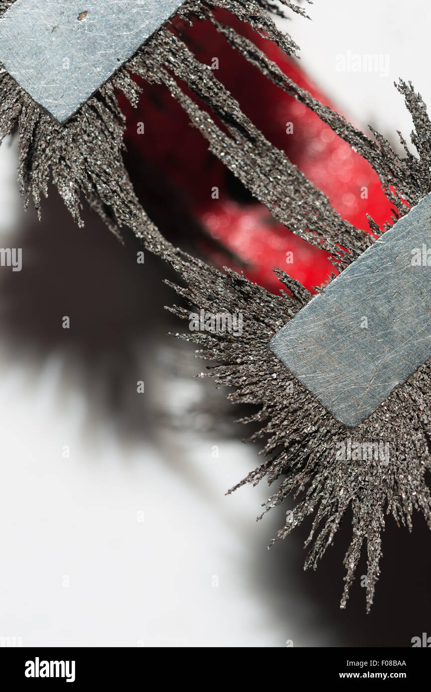 Attraction and repulsion iron metal particles align up along the ...