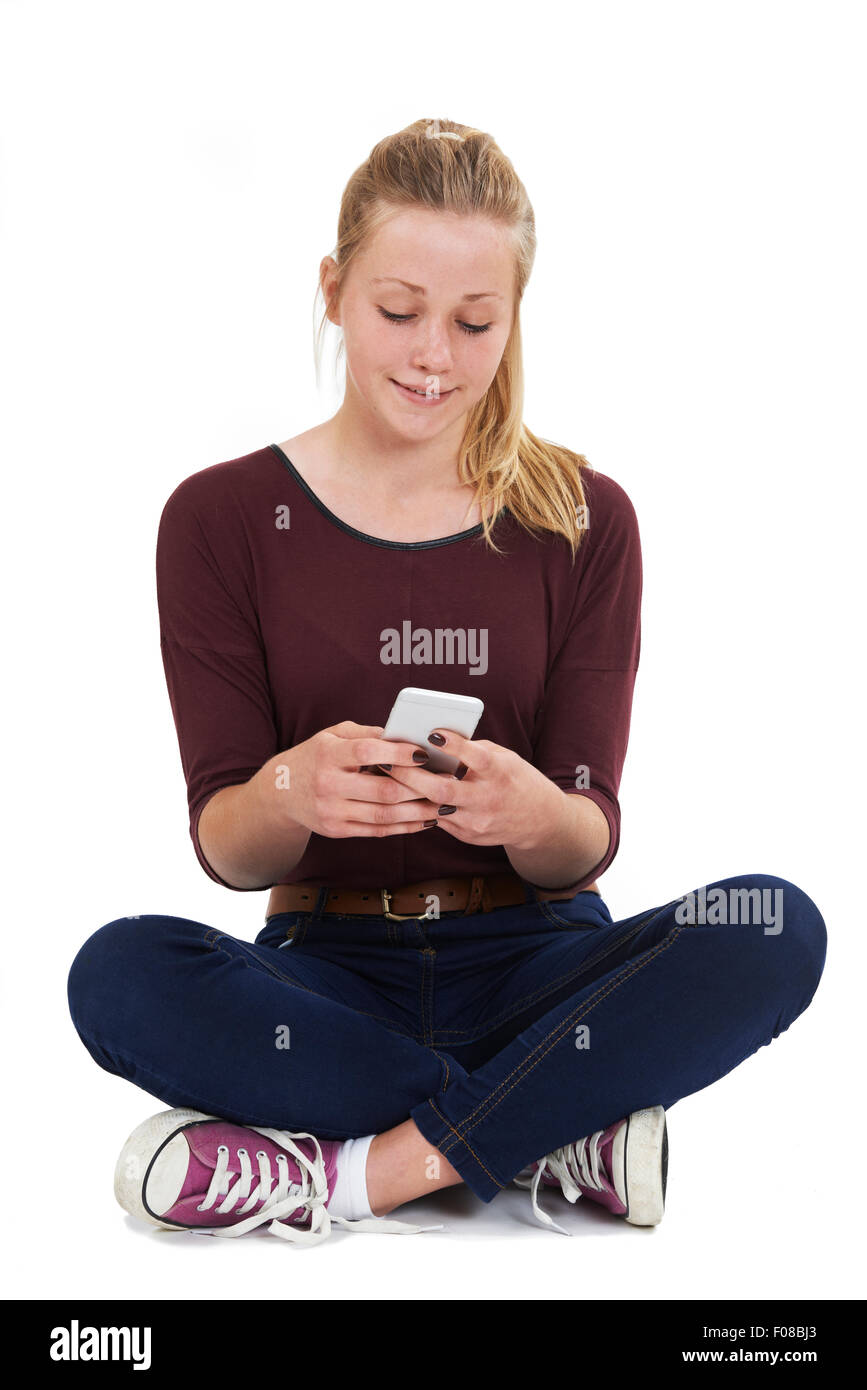 Studio Shot Of Teenage Girl Sending Text Message Stock Photo - Alamy Studio Shot Of Teenage Girl Sending Text Message Stock Photo - Alamy