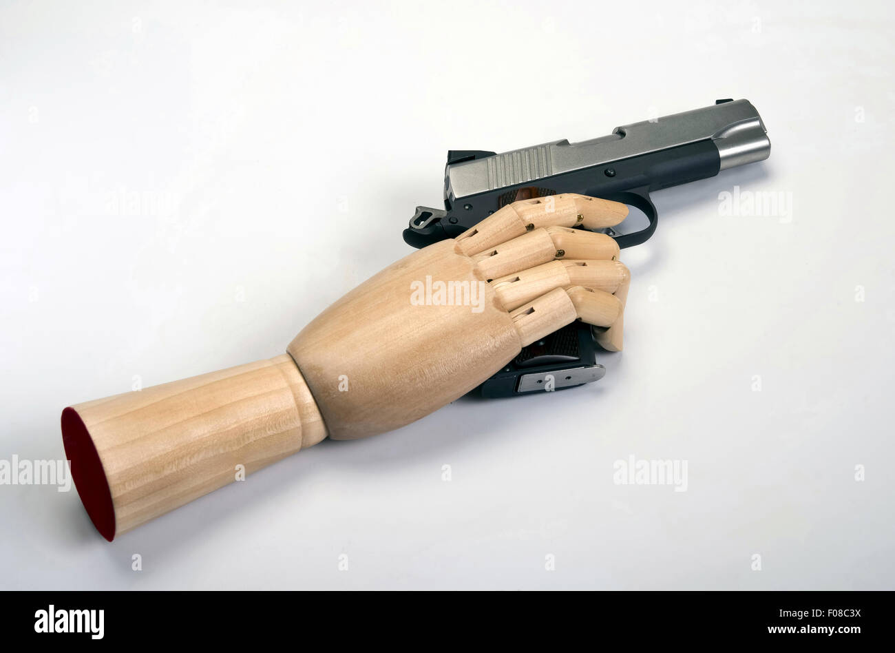 45 Caliber handgun with wooden arm Stock Photo - Alamy