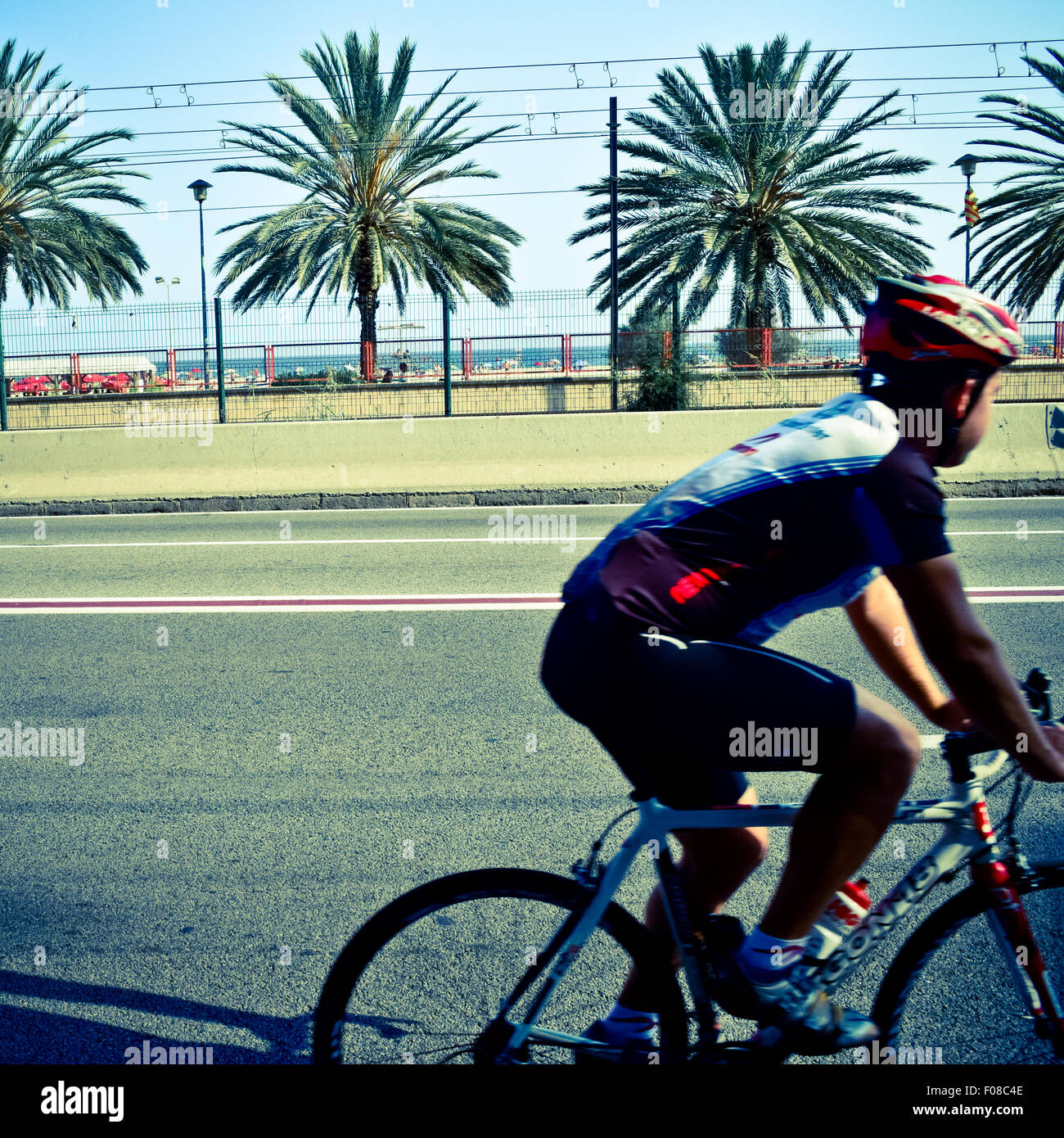Cyclist training on bicycle. N-II road. Maresme, Barcelona province ...