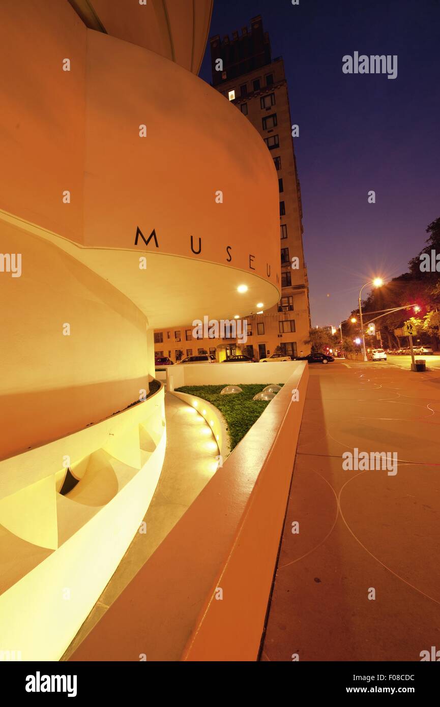Exterior of Solomon R. Guggenheim Museum at night in New York, USA ...