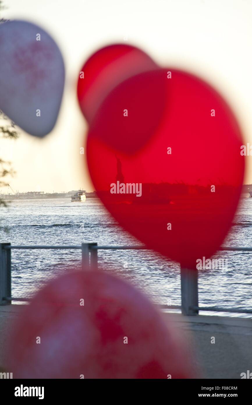 Overlooking the Statue of Liberty by balloons, New York, USA Stock ...