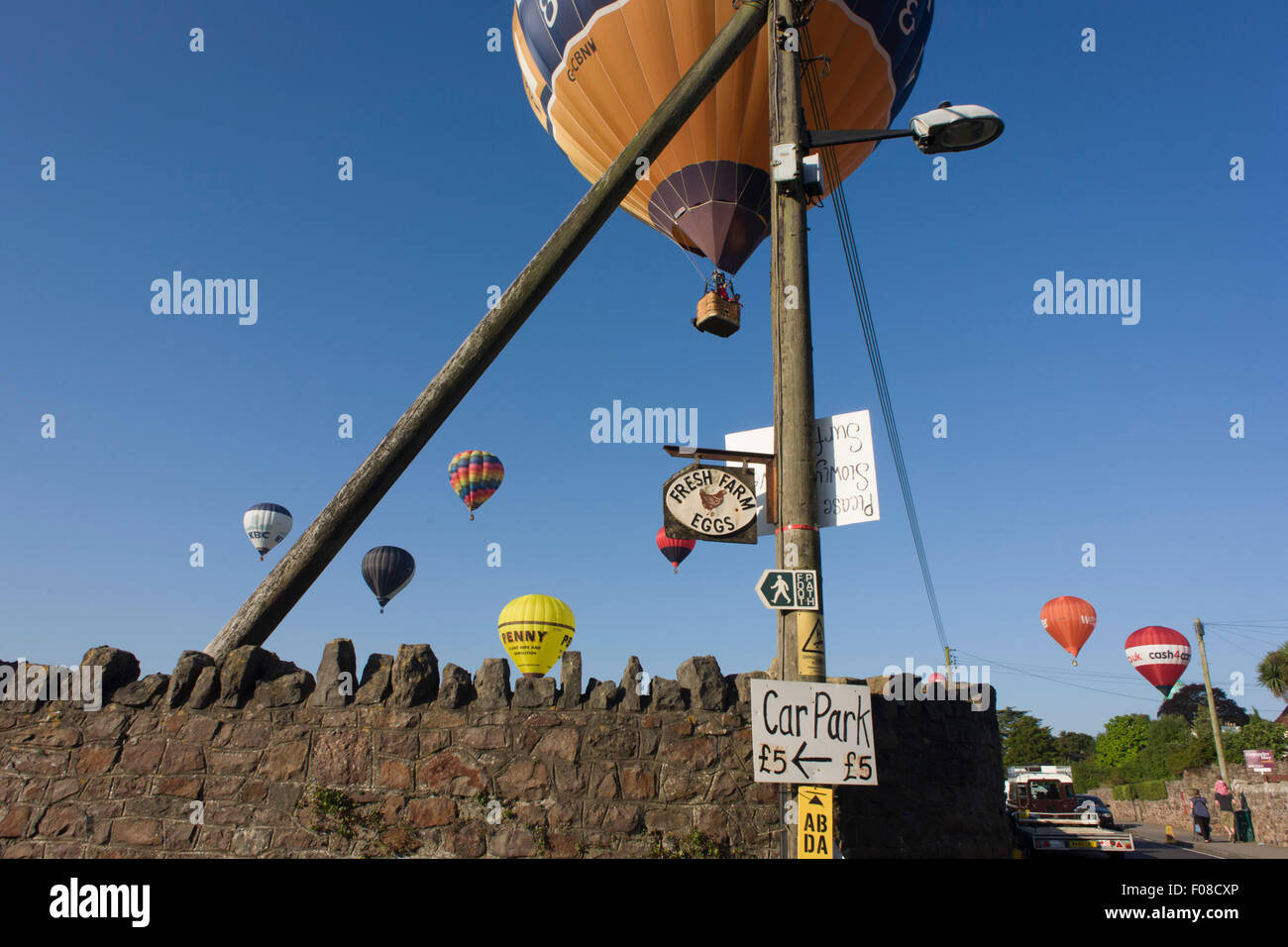 Balloons float overhead during the mass lift-off by balloons at ...