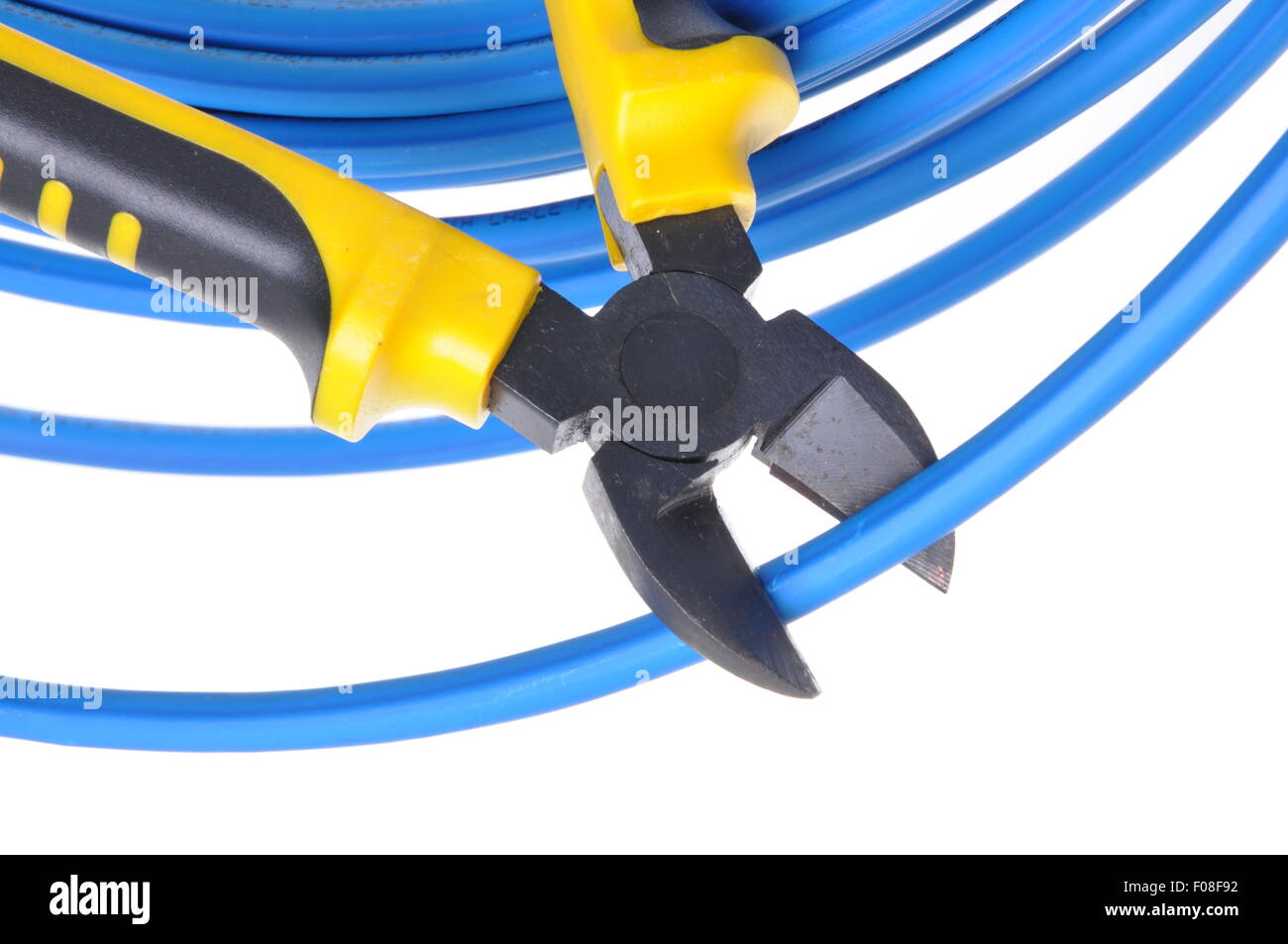 Tool pliers cutting blue cable isolated on white background Stock Photo ...