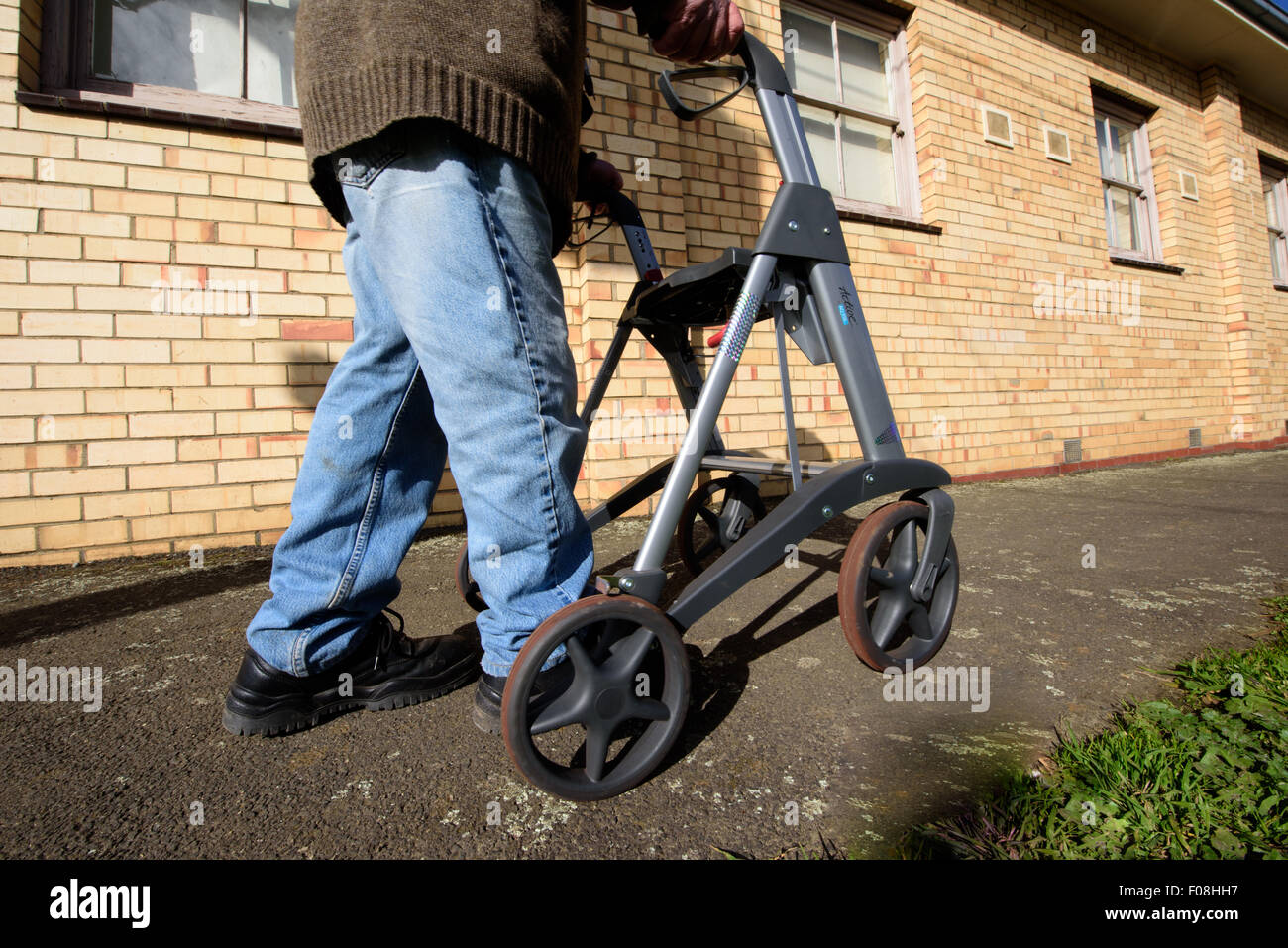 Elderly man walking frame hi-res stock photography and images - Alamy