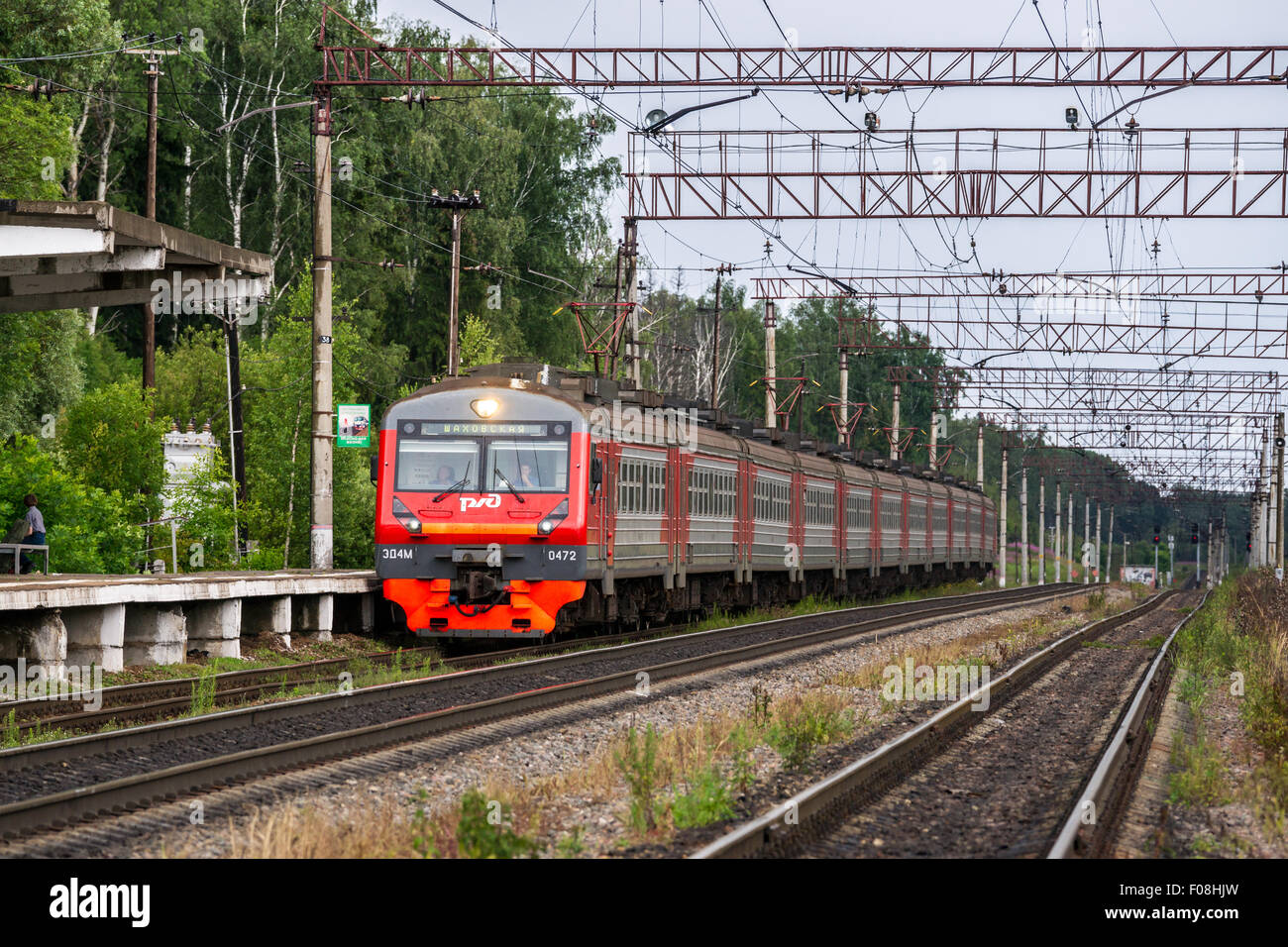 Commuter train approaching a station in Russia Stock Photo - Alamy